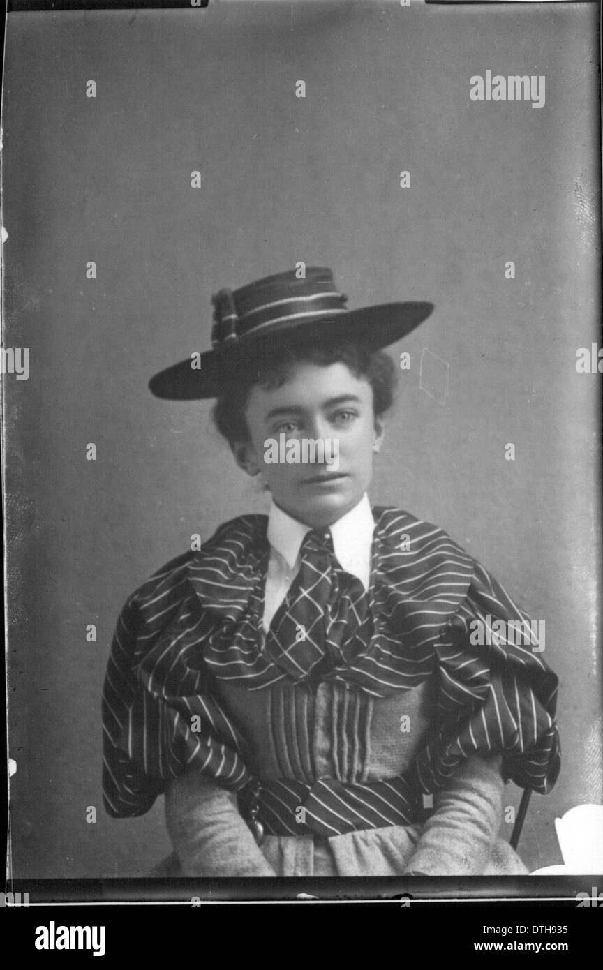 This portrait photograph captures a woman from an unknown time period ...