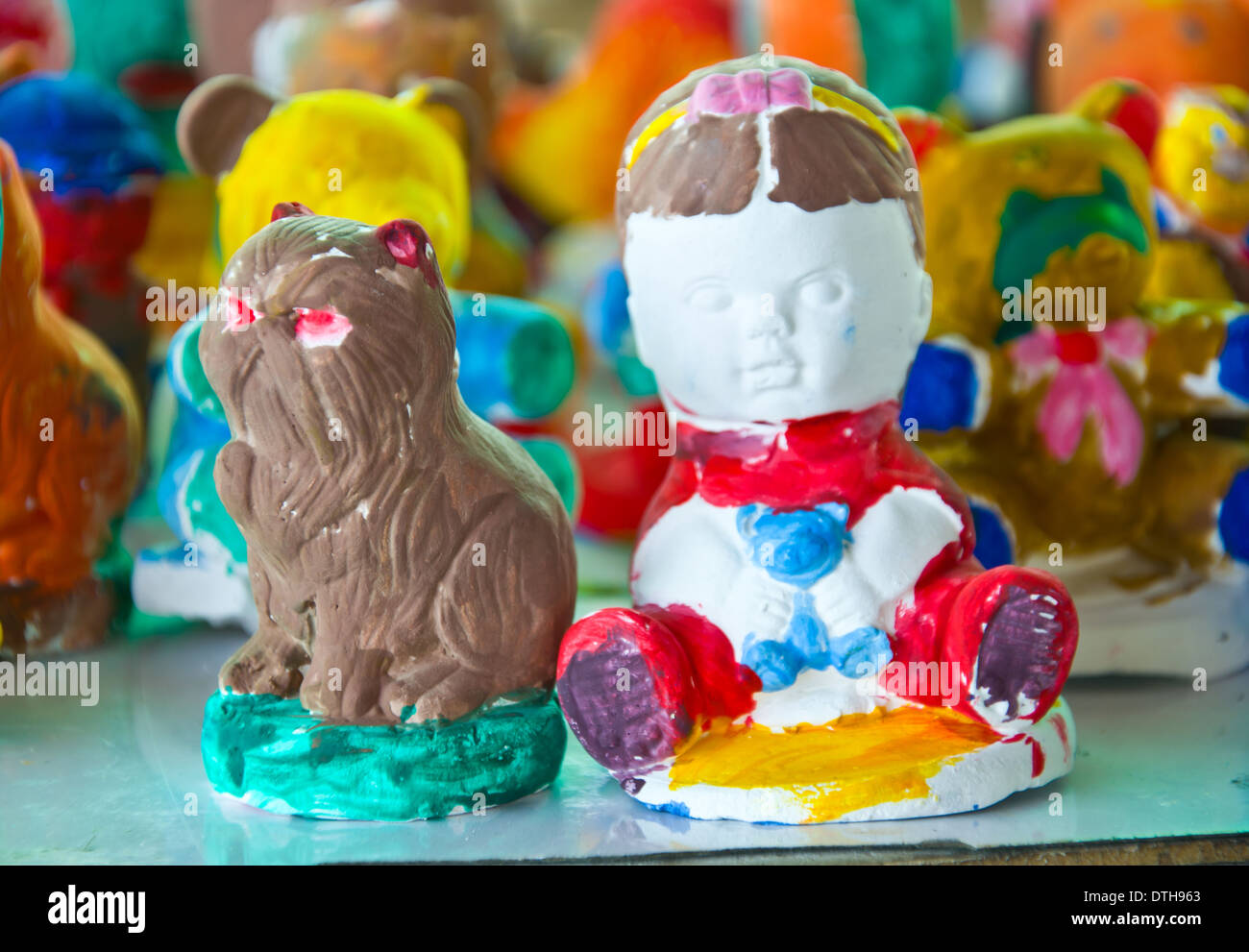 stone craft of doll art from children Stock Photo - Alamy