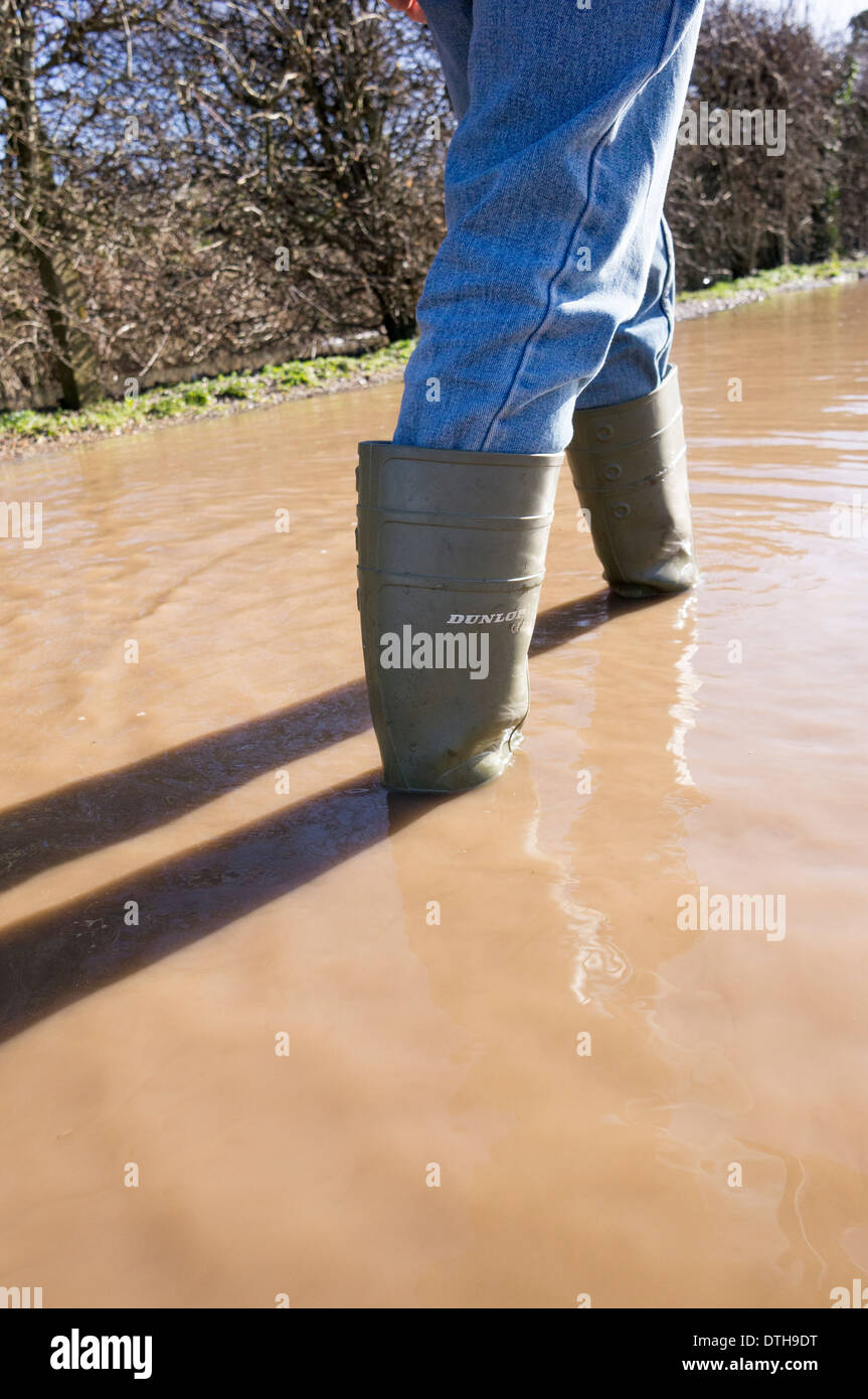 Person wading flood water hi-res stock photography and images - Alamy