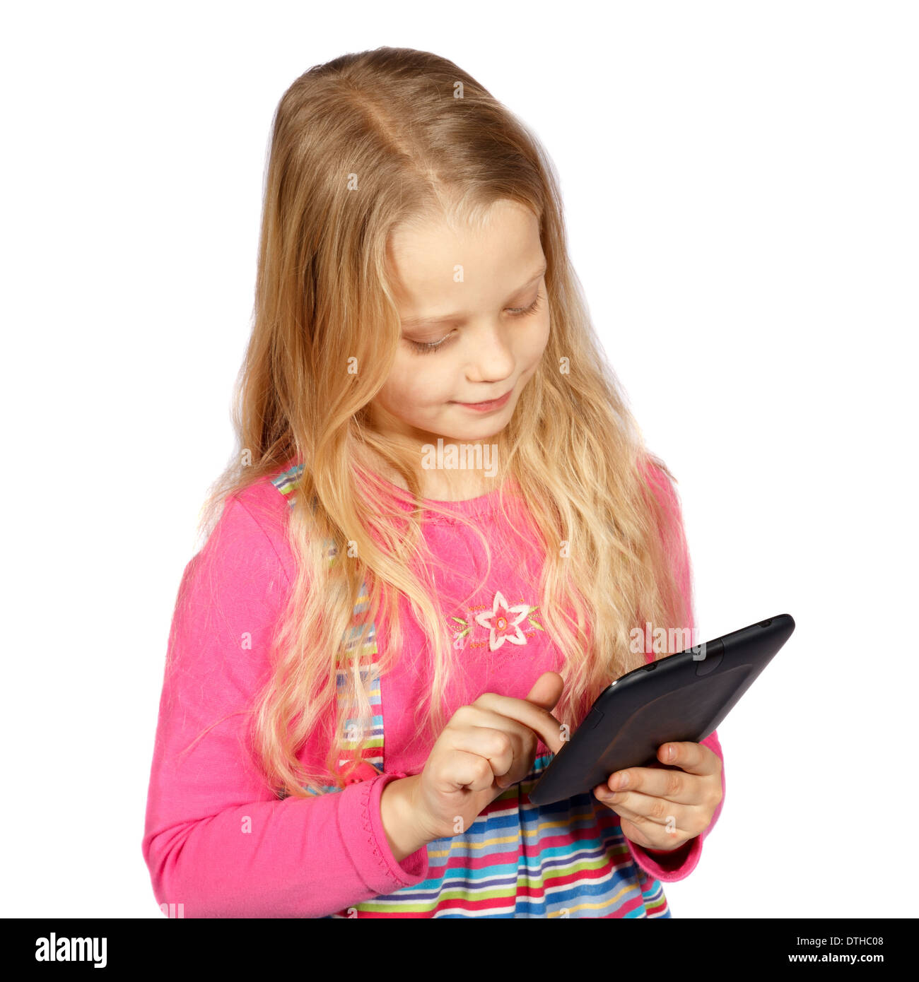 little girl using a touch screen computer on white background Stock ...