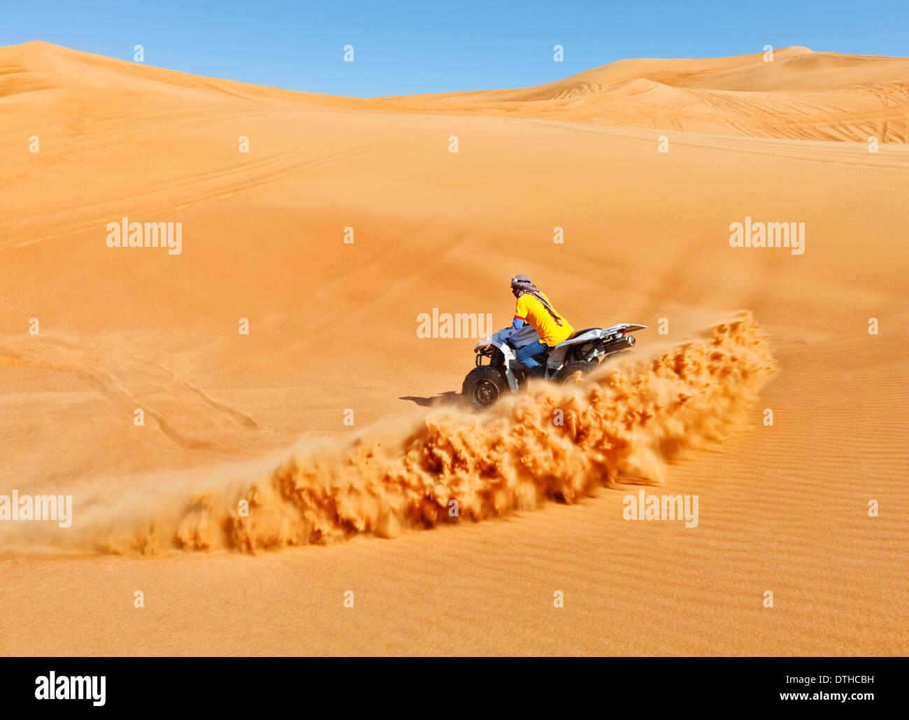Dubai desert quad driving Stock Photo - Alamy