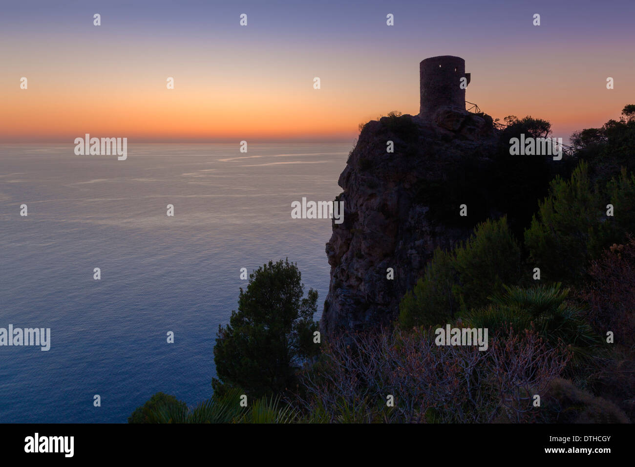 16th century Torre des Verger pirate watchtower at sunset. Banyalbufar ...