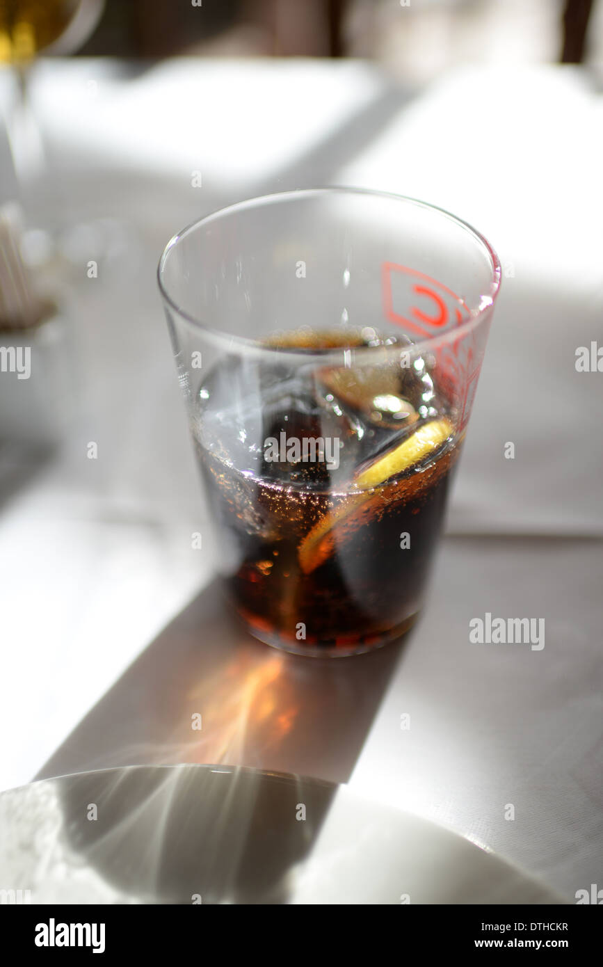 Glass of coke, ice and lemon Stock Photo - Alamy