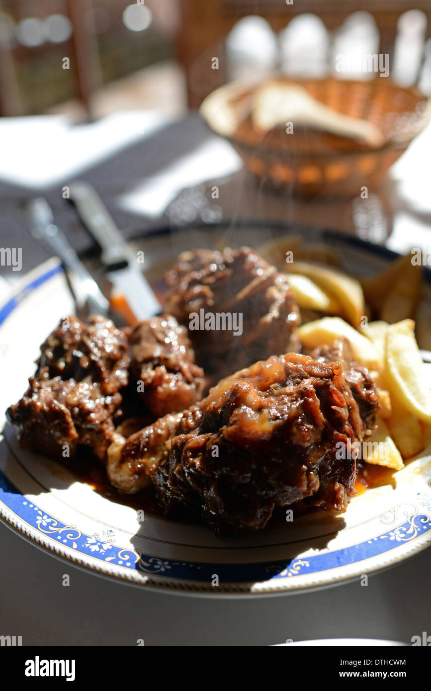 Oxtail stew with fries Stock Photo - Alamy