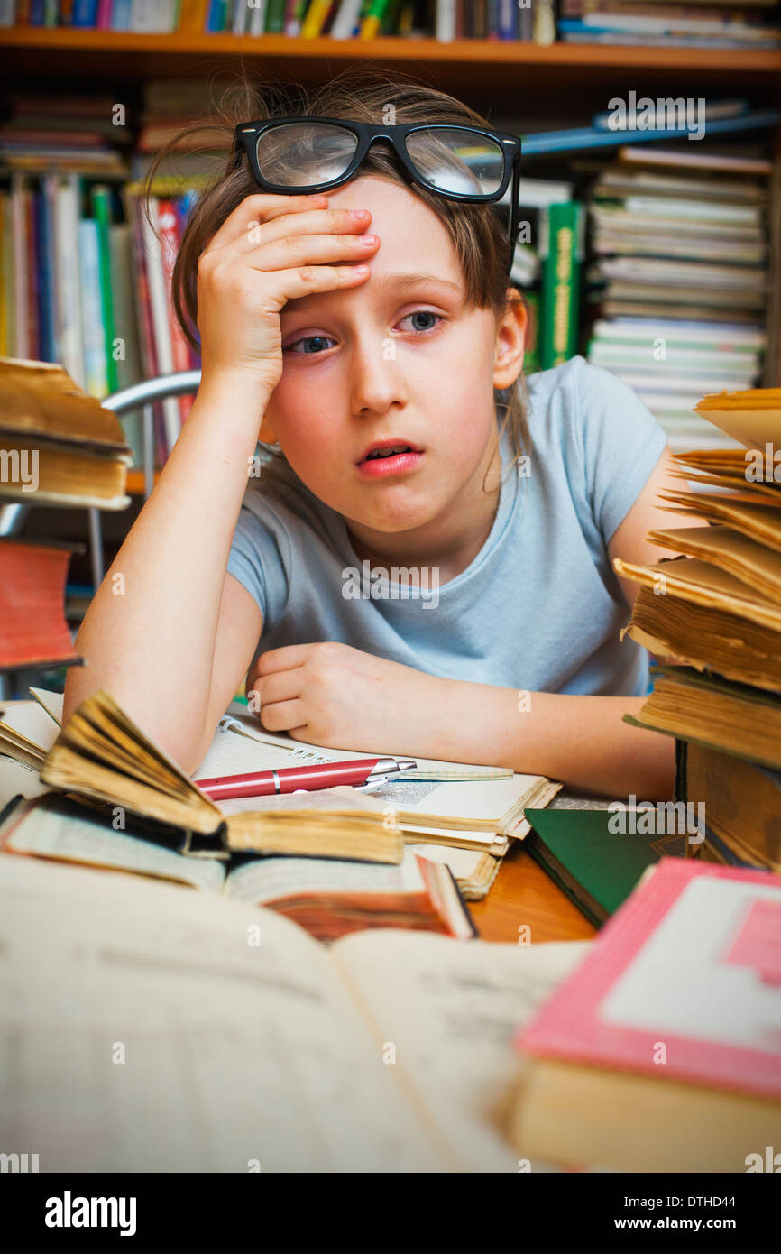 Girl tired of learning lessons Stock Photo - Alamy