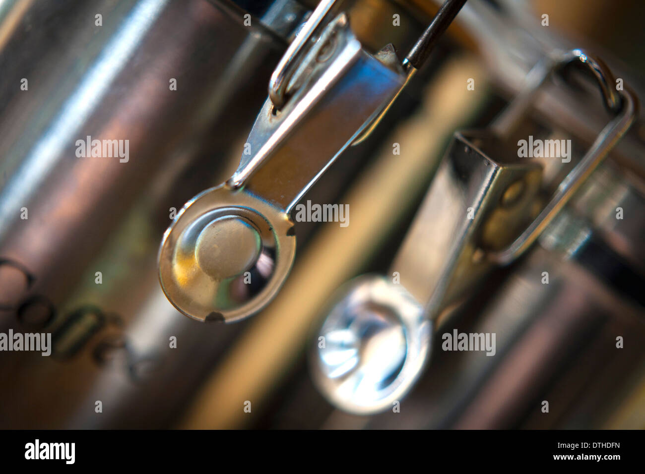 close-up detail of metallic stainless steel containers showing open and ...