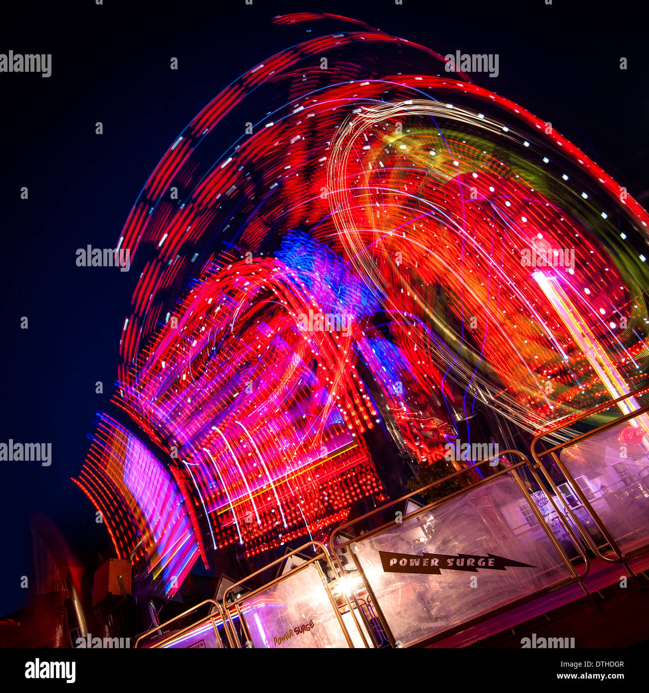 Long exposure image of fairground ride after dark Stock Photo - Alamy