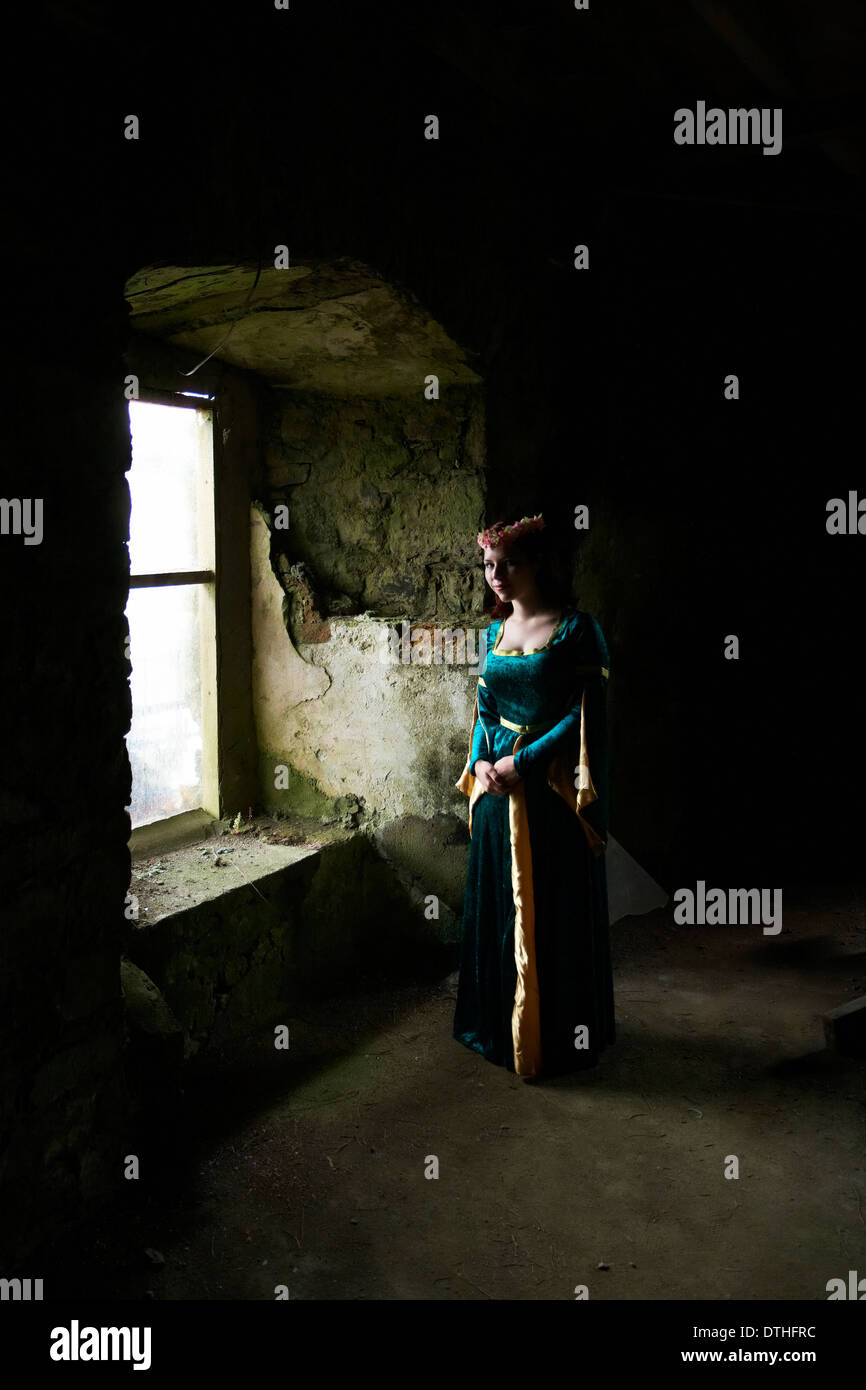 Girl at a window Stock Photo - Alamy