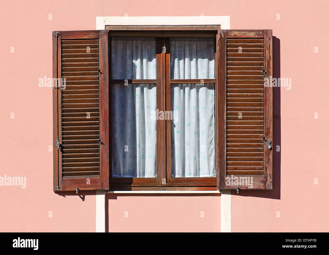 Rustic window with wooden shutters hi-res stock photography and images ...