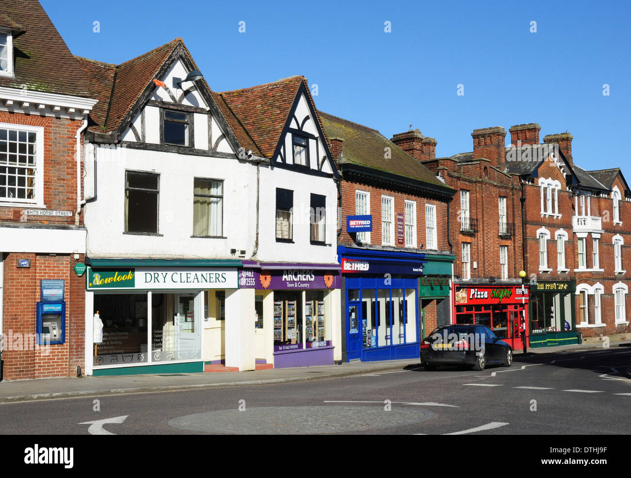 Town centre with mini traffic roundabout, Baldock, Hertfordshire ...
