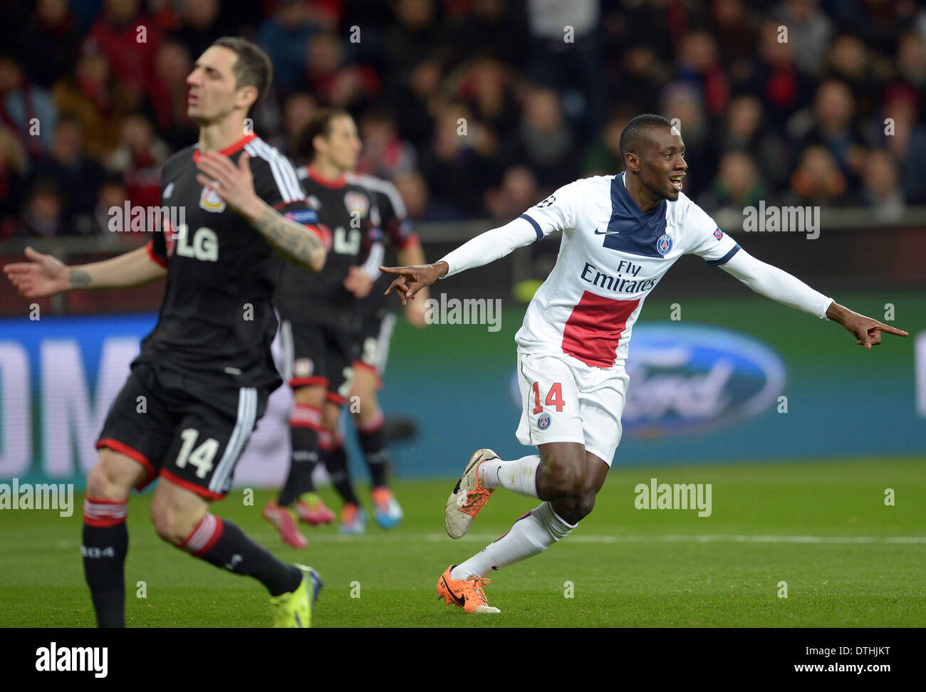 Leverkusen, Germany. 18th February 2014. Blaise Matuidi (right) of ...