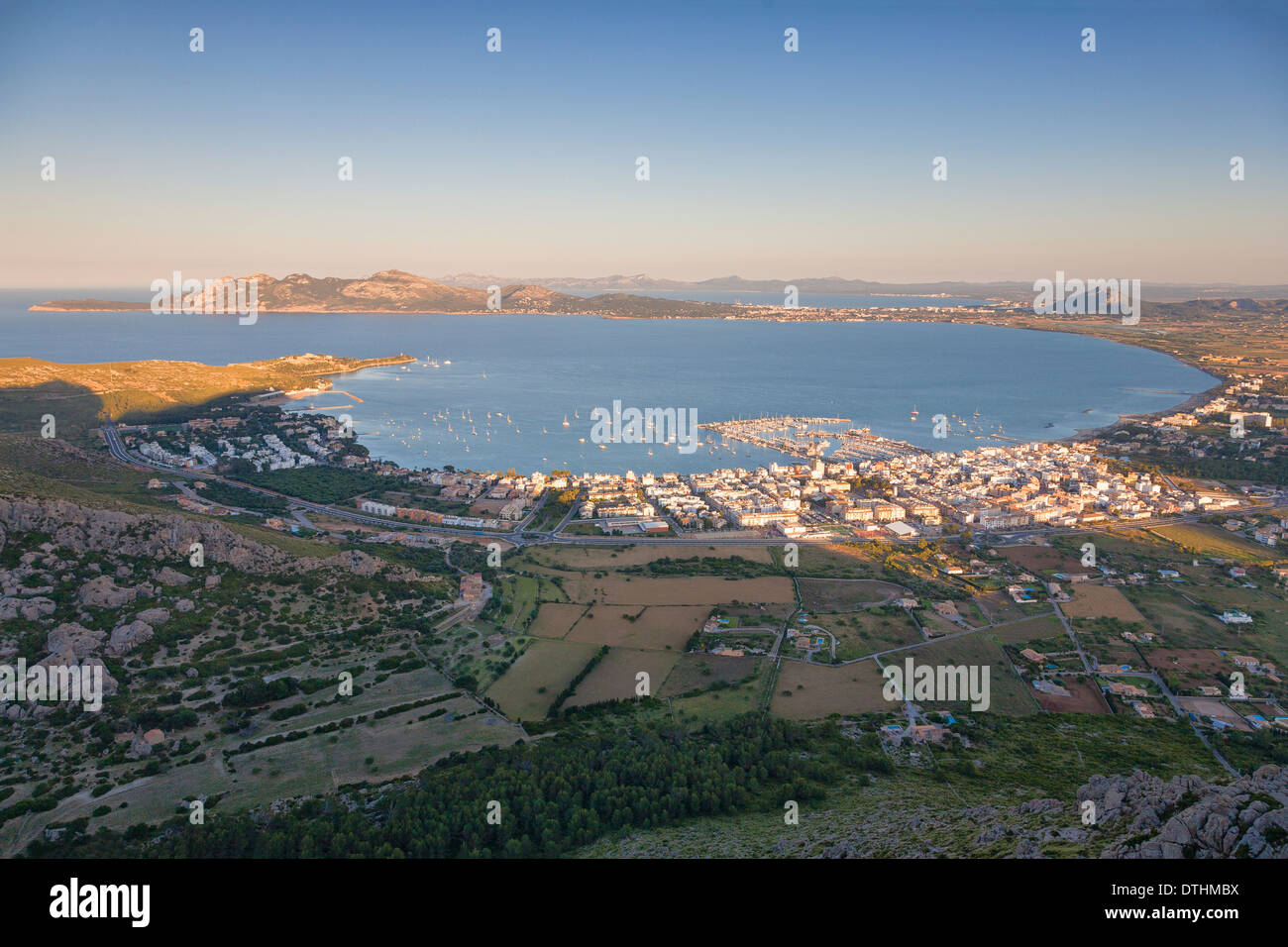 Evening Summer view of Port de Pollensa resort and Pollensa harbour ...