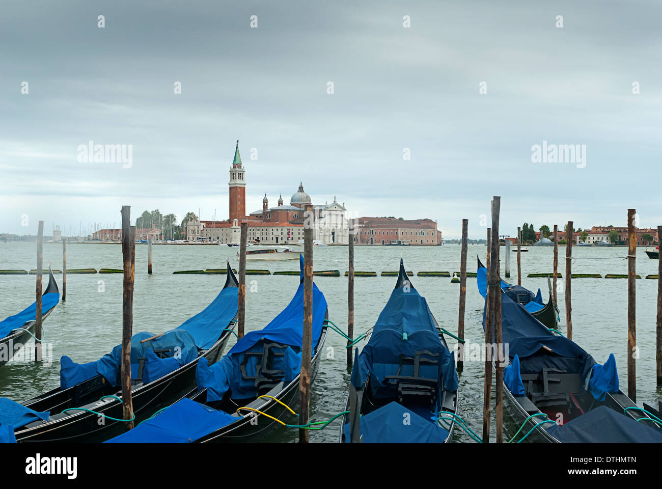 The iconic black gondolas in Venice near San Giorgio Maggiore Stock ...