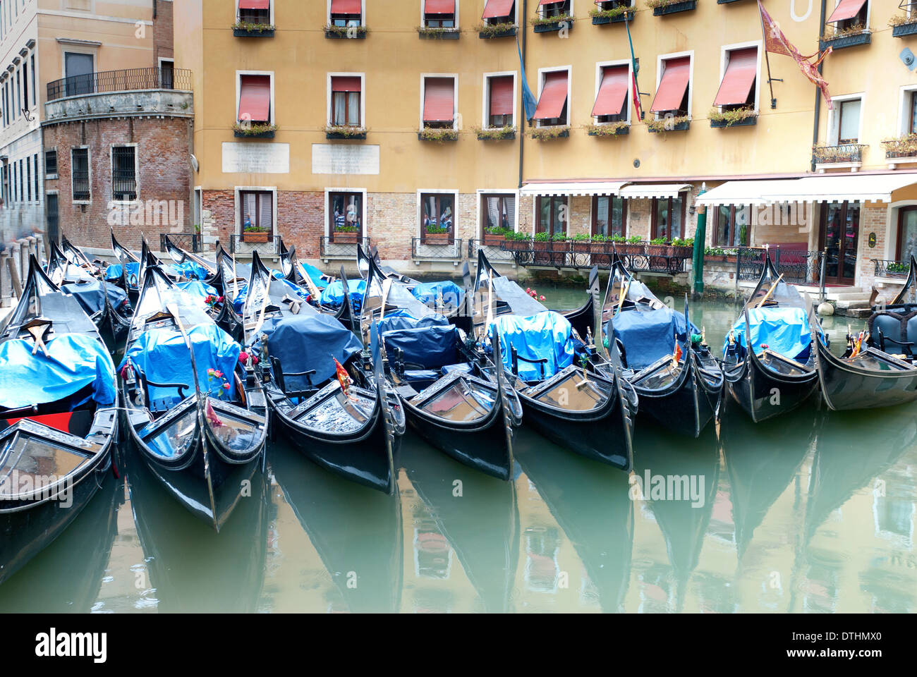 Venice iconic black gondolas Stock Photo - Alamy