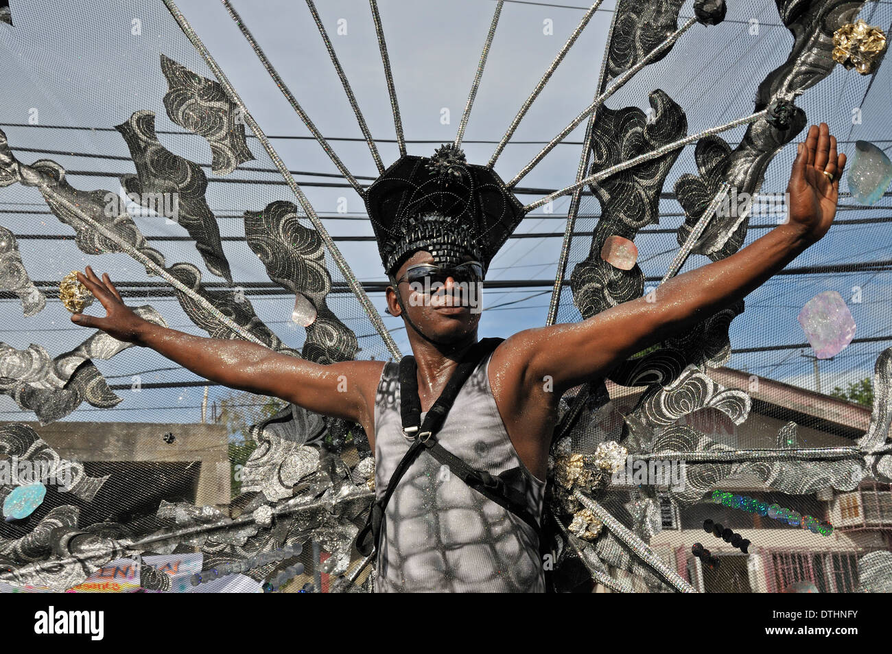 Masquerader at carnival celebration in the streets of Scarborough ...