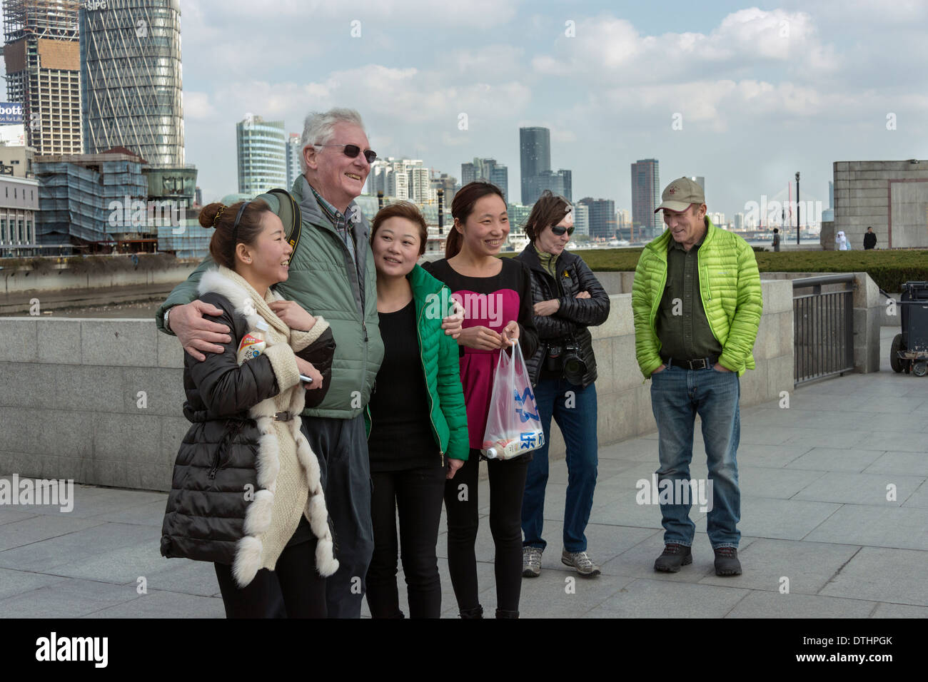 Tourists interacting locals hi-res stock photography and images - Alamy