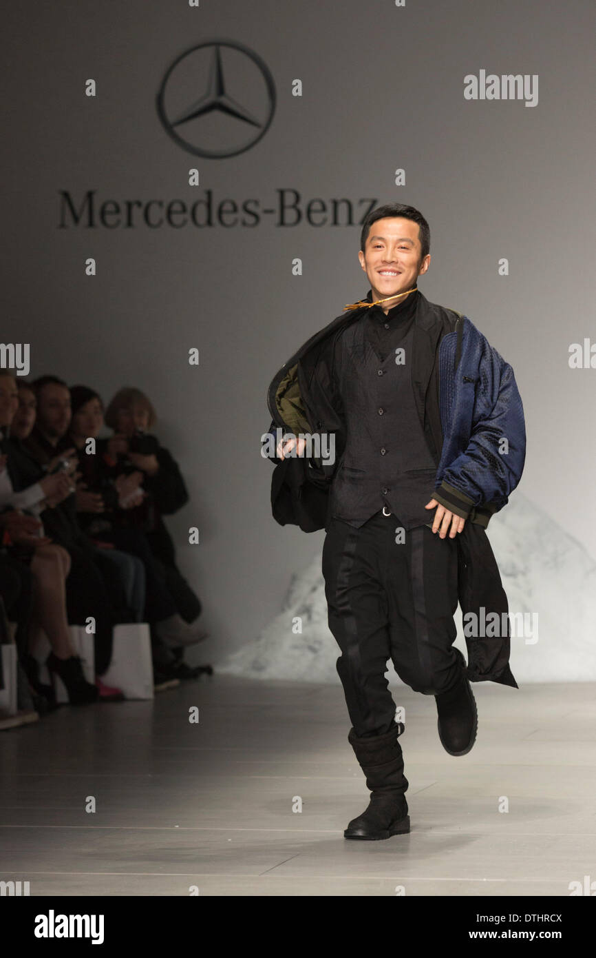 18 February 2014, London, England, UK. Fashion designer Simon Gao at the end of the Mercedes ...