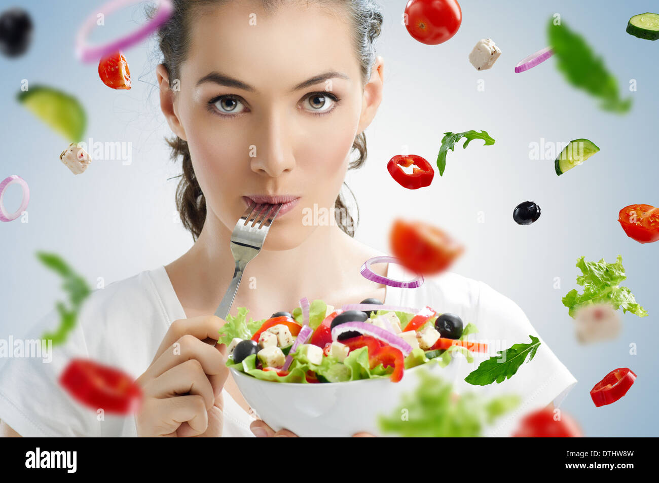 A beautiful girl eating healthy food Stock Photo - Alamy