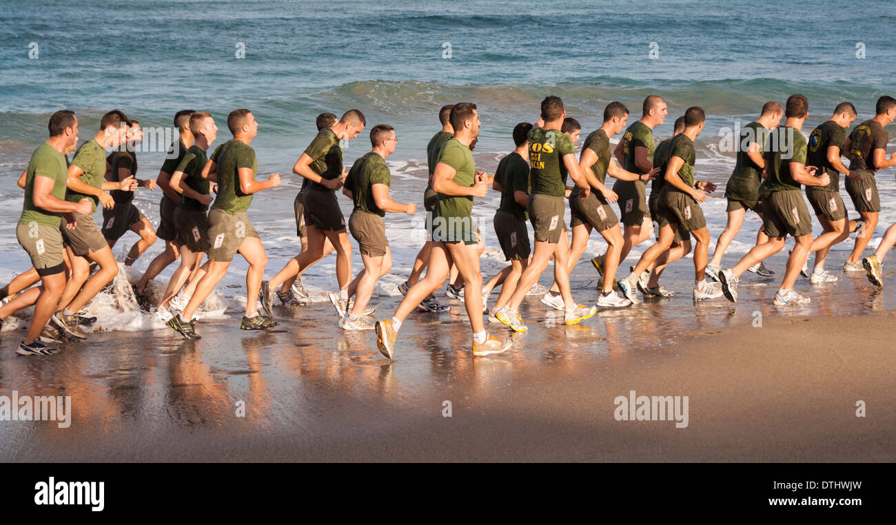 Spanish soldiers early morning run on beach in Las Palmas, Gran Canaria ...