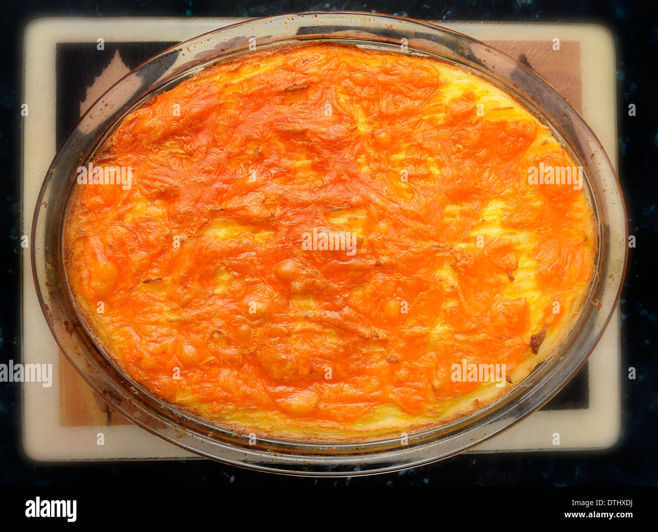 Home made shepards pie topped with red Leicester cheese Stock Photo - Alamy