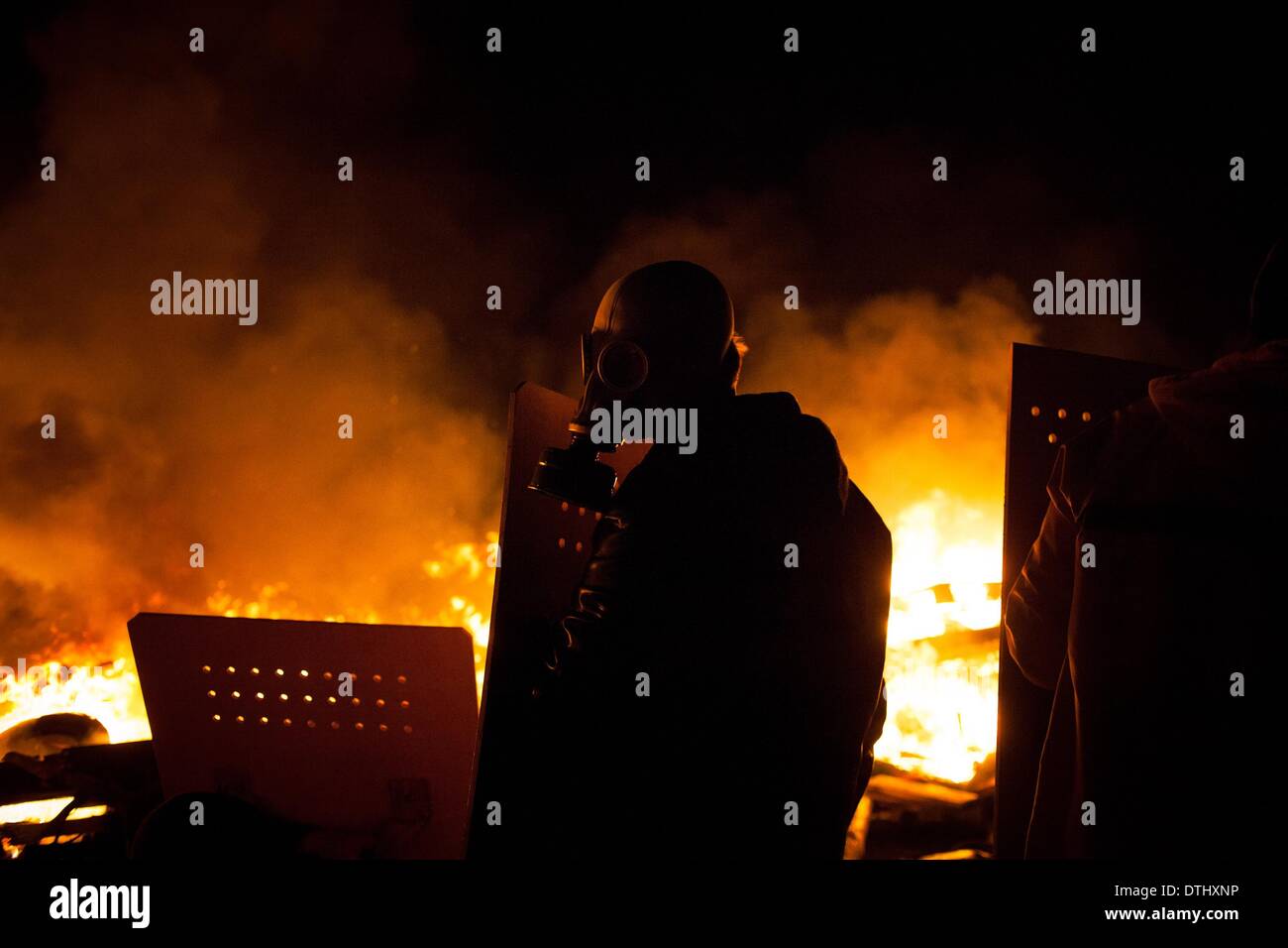 Kiev, Ukraine. 18th Feb, 2014. Anti-government protesters clash with ...