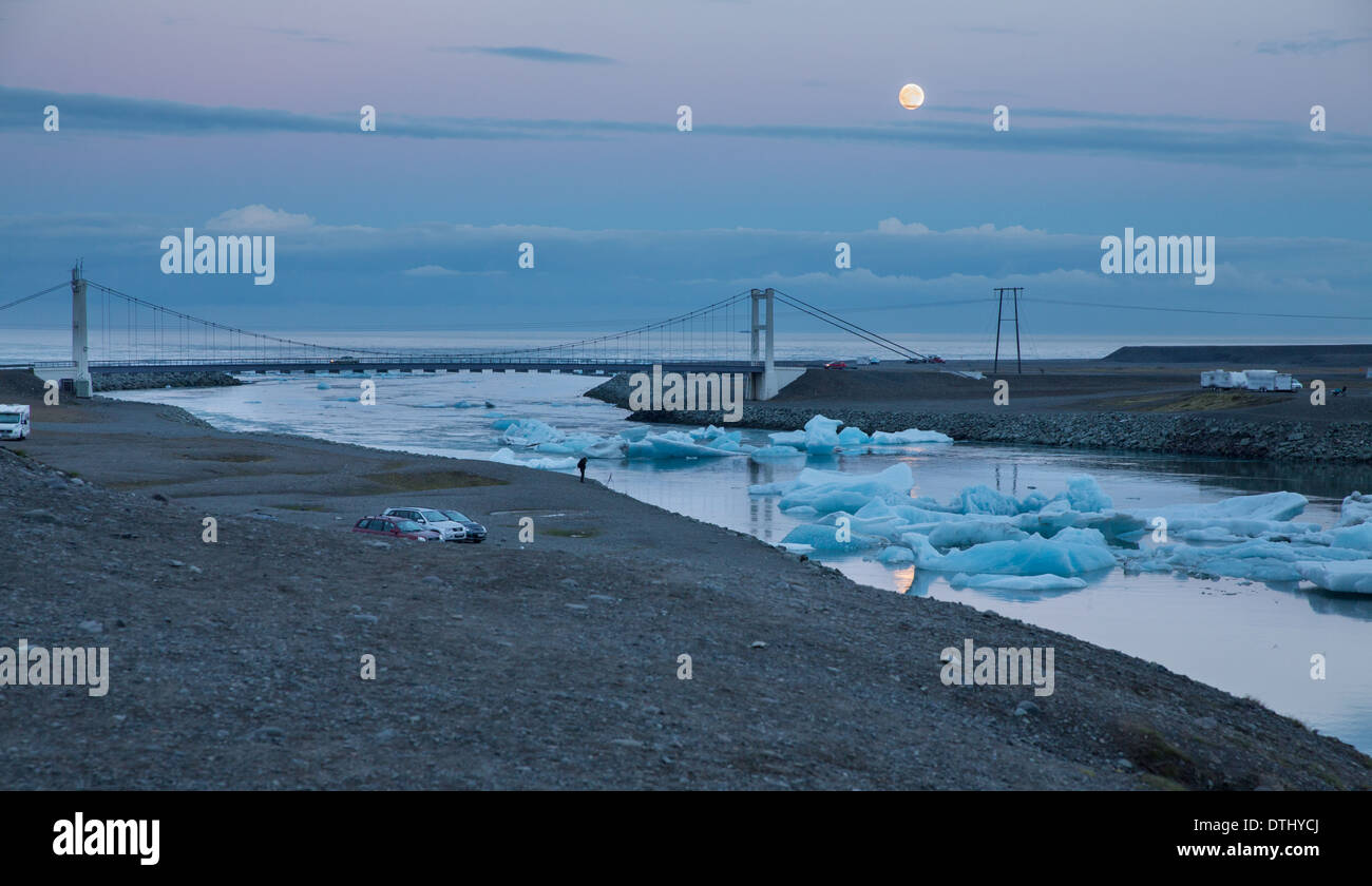 blue icebergs floating and full moon Stock Photo - Alamy