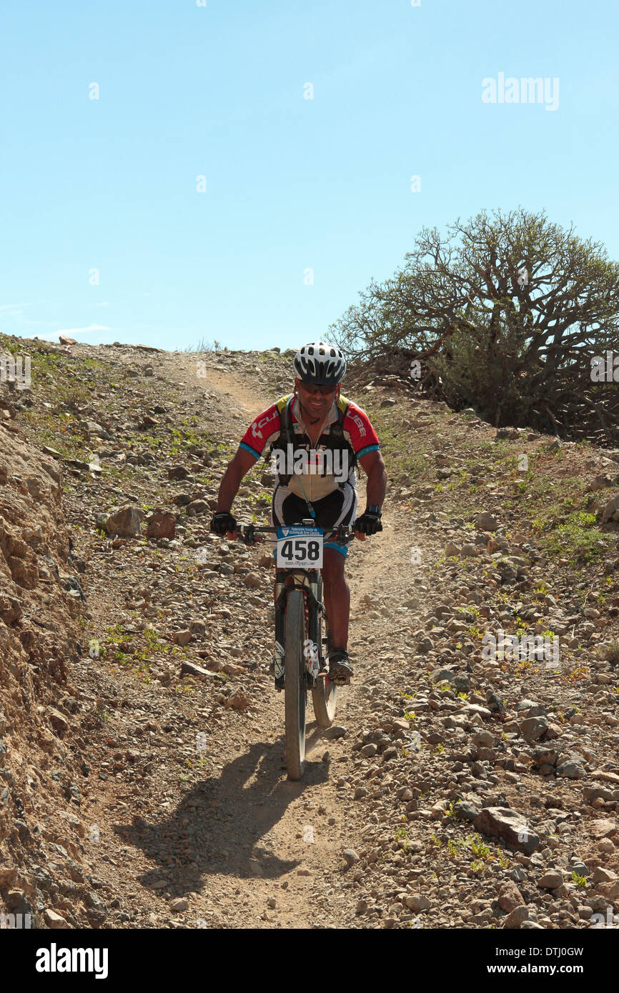 A rider competing on a mountain bike trial Stock Photo - Alamy