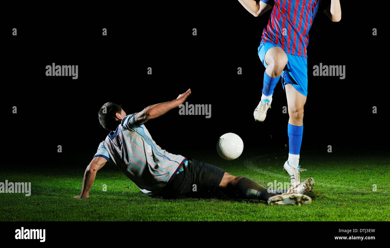 football players in competition for the ball Stock Photo - Alamy