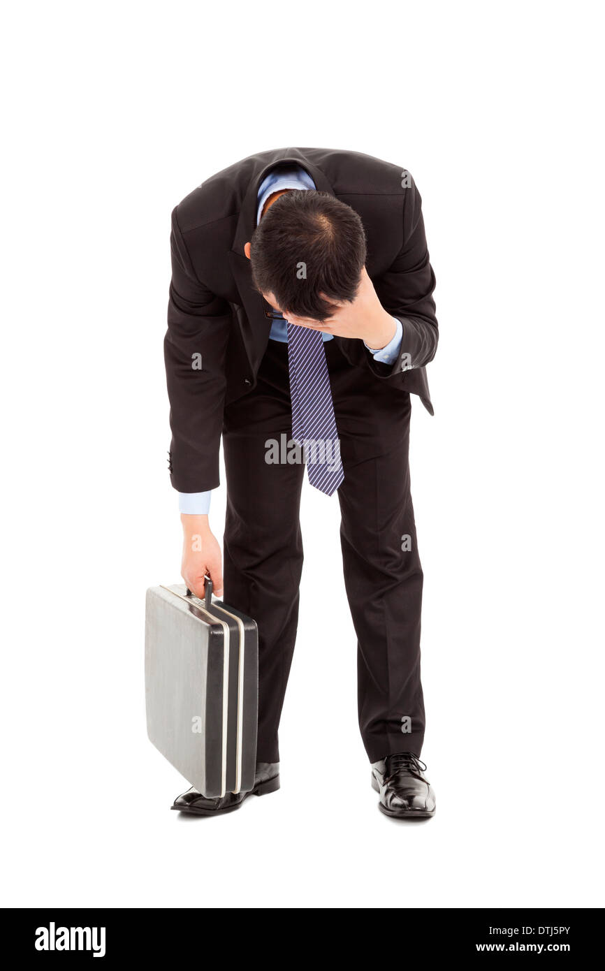 afflictive businessman stoop and hold his head over white Stock Photo ...