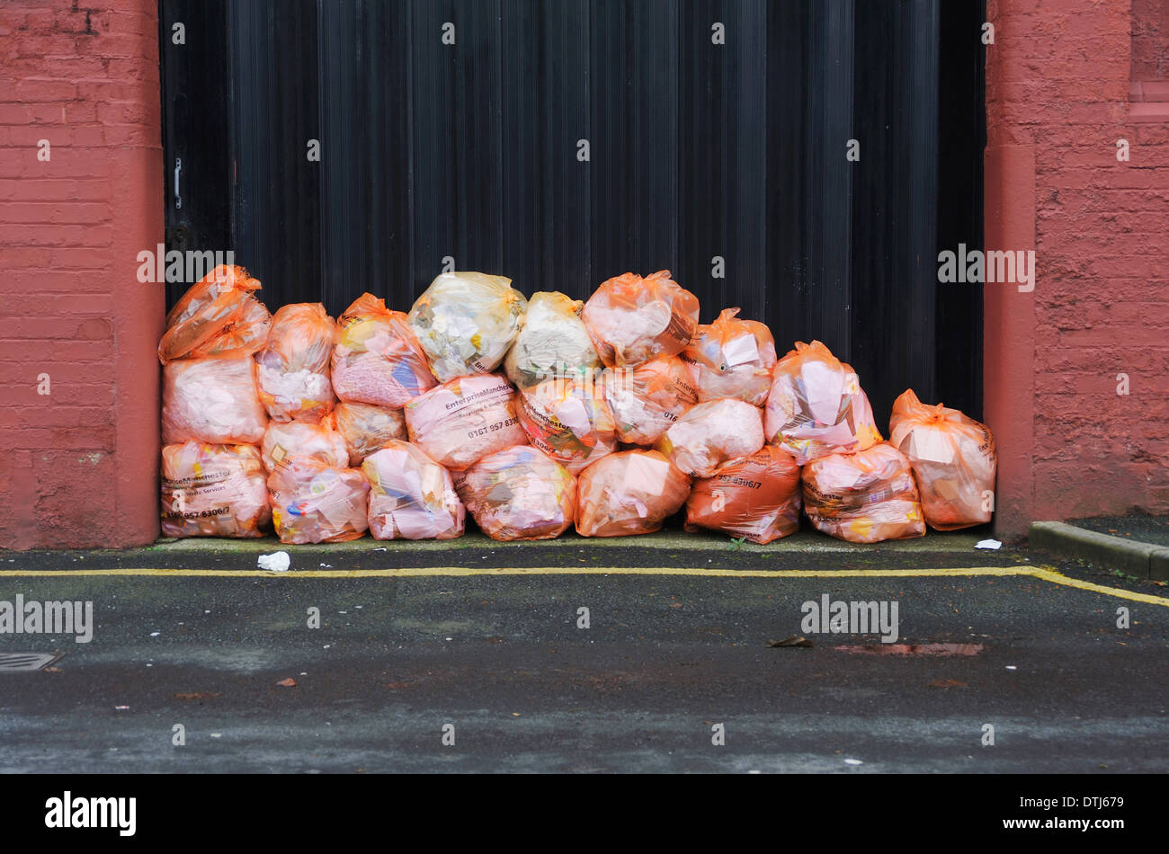 Rubbish stacked in doorway ready for collection for recycling Stock ...