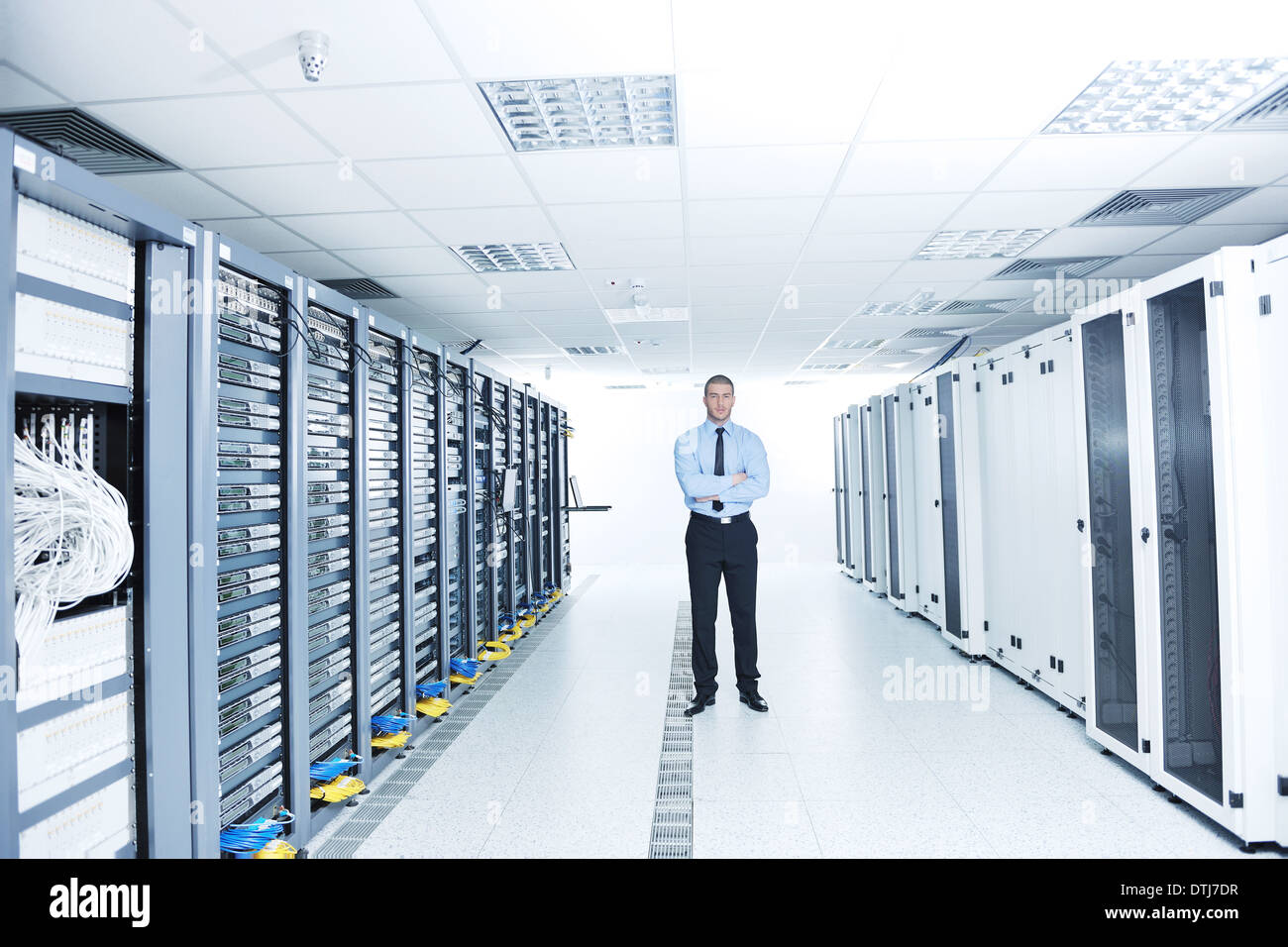 young it engeneer in datacenter server room Stock Photo - Alamy
