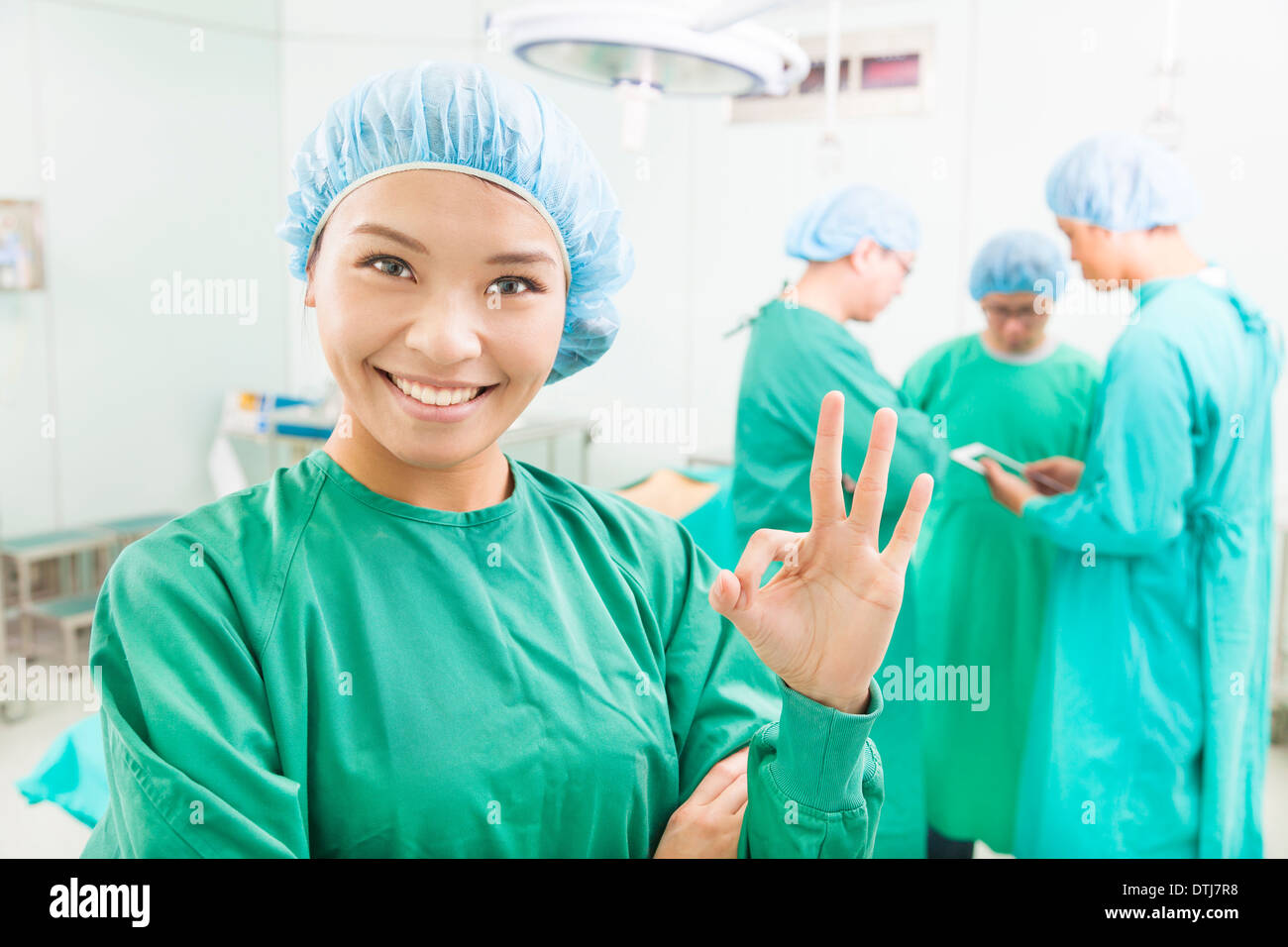 surgeons finish the operation and thumb up at hospital Stock Photo - Alamy