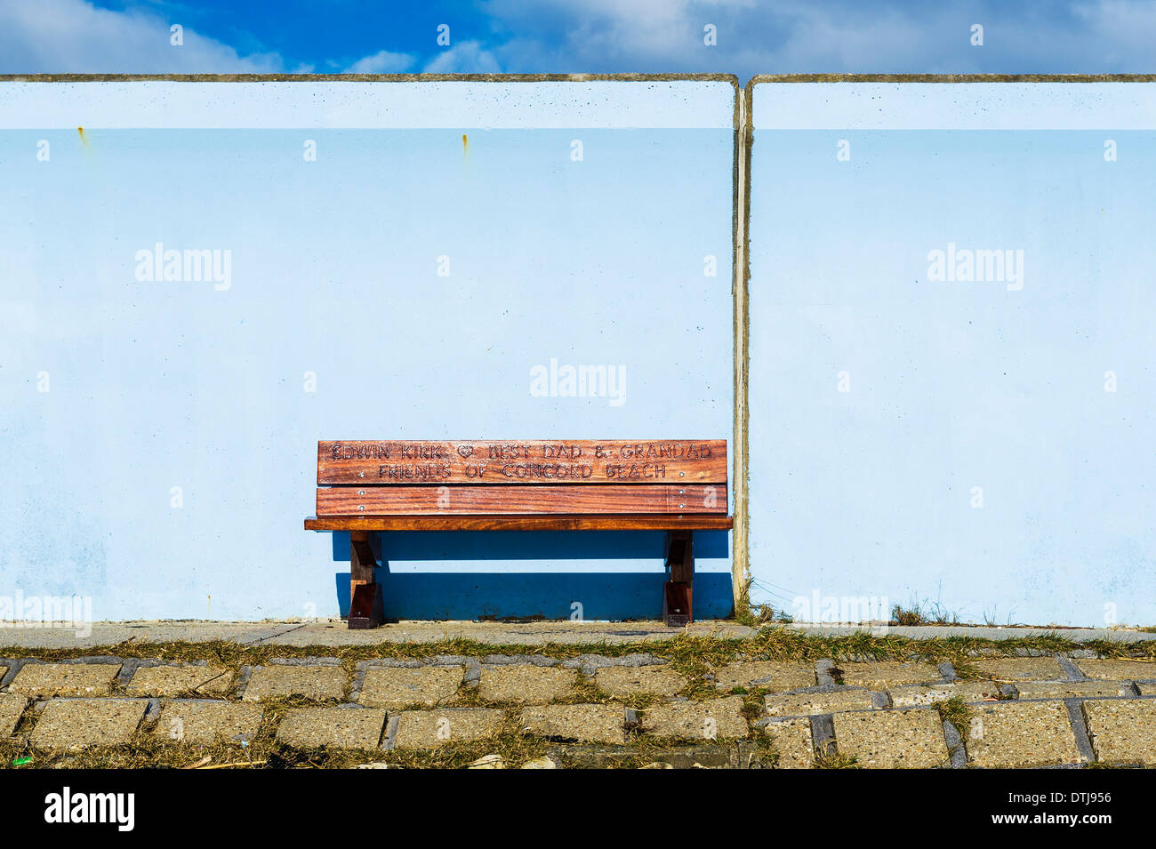 Canvey Island - A wooden memorial bench on the sea wall flood defence ...