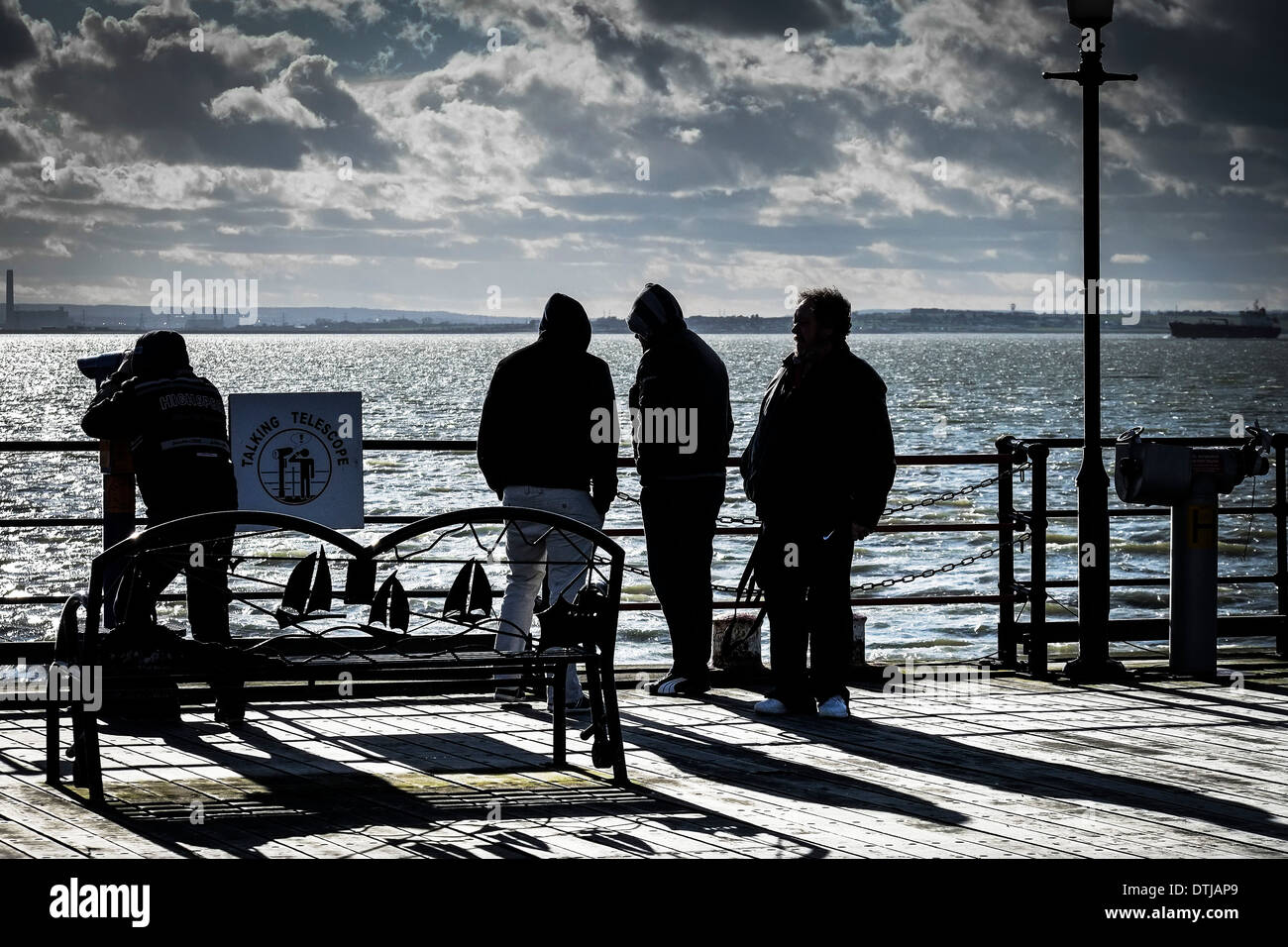 Men on pier hi-res stock photography and images - Alamy