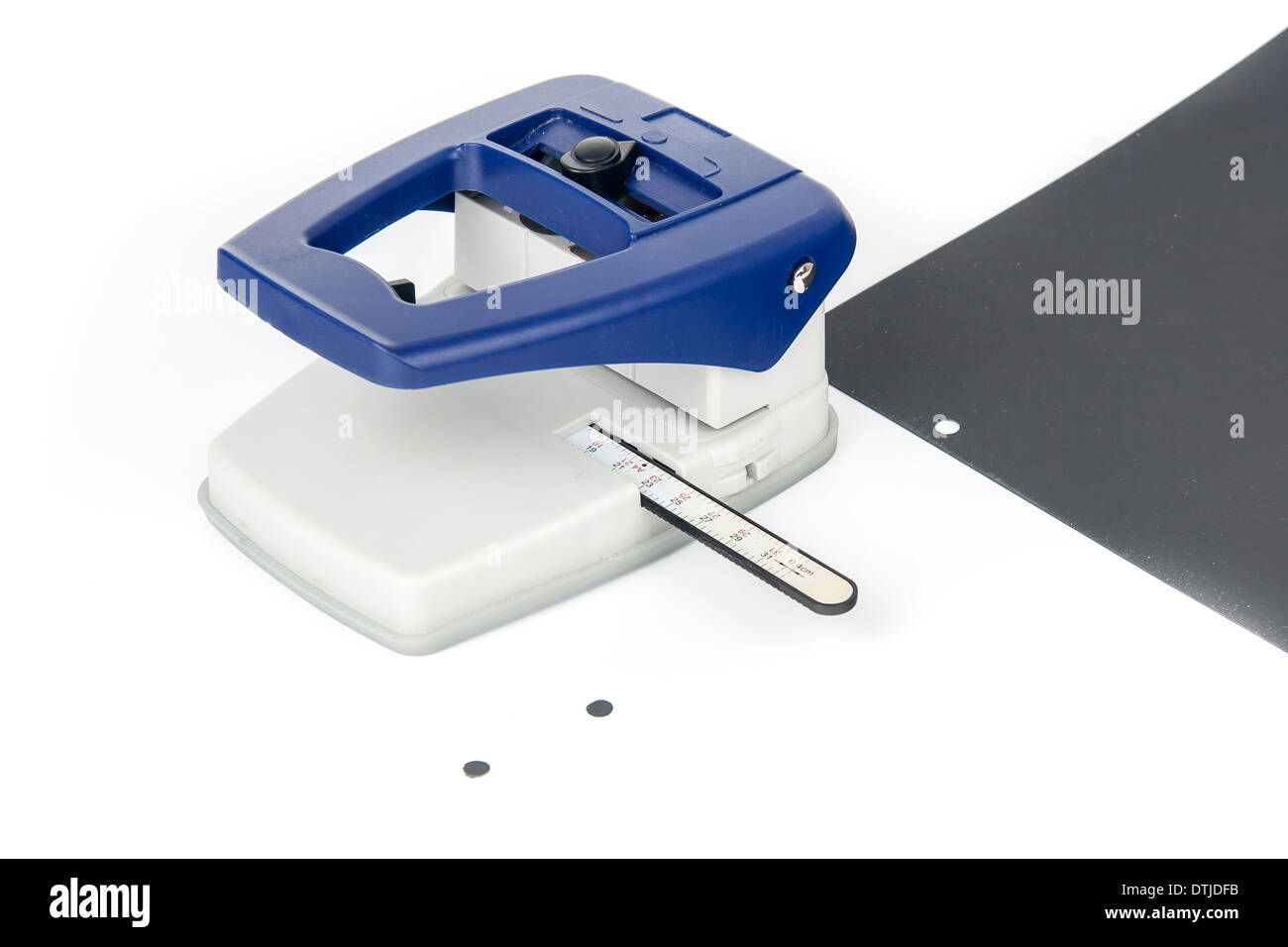 Office Puncher Unit isolated on white background Stock Photo - Alamy