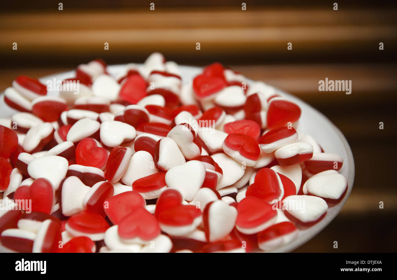Red sweets hi-res stock photography and images - Alamy
