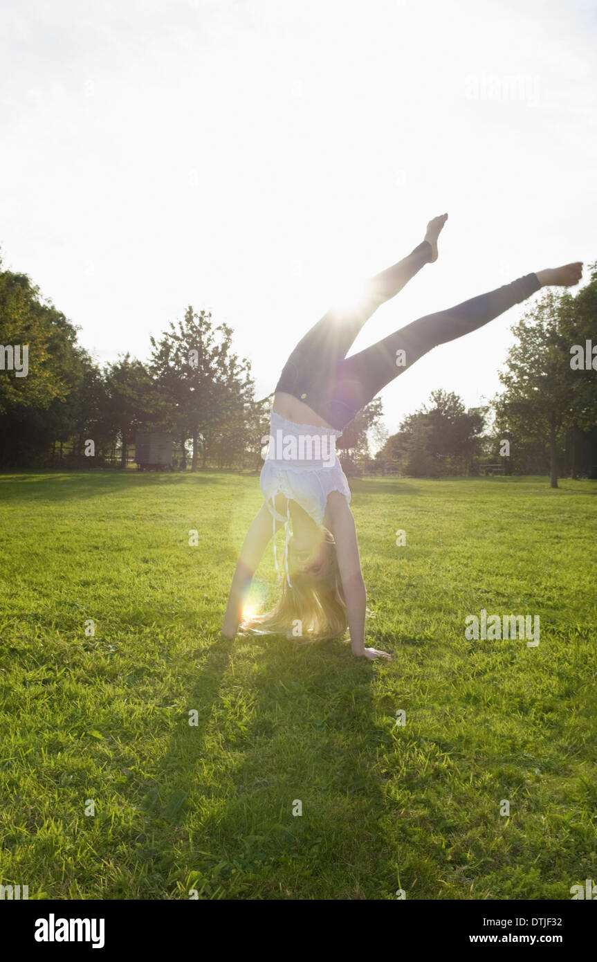 Doing headstand hi-res stock photography and images - Alamy