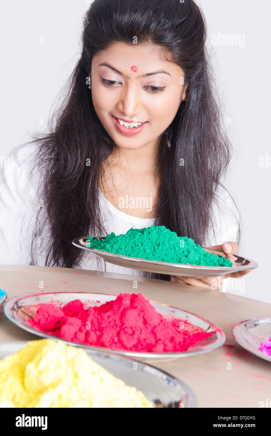 Woman holding plate holi colour hi-res stock photography and images - Alamy