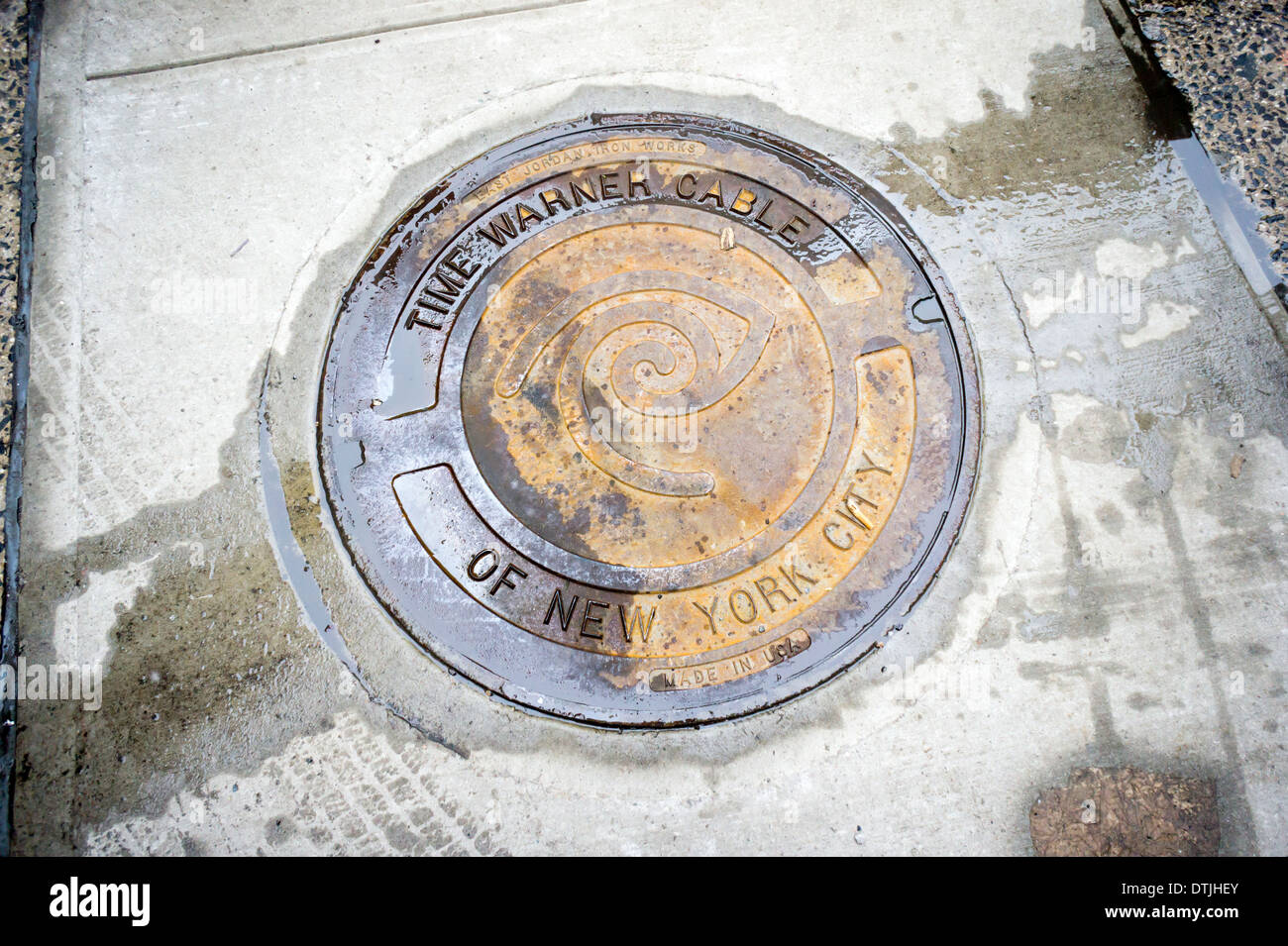 A Time Warner Cable labeled manhole in the Chelsea neighborhood of New ...