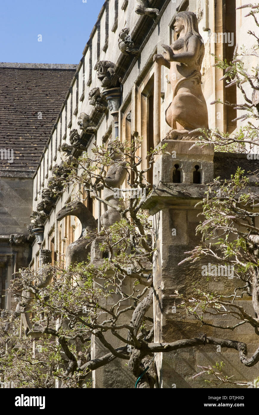 Sculptures on the side of the building at Magdalen College, Oxford ...