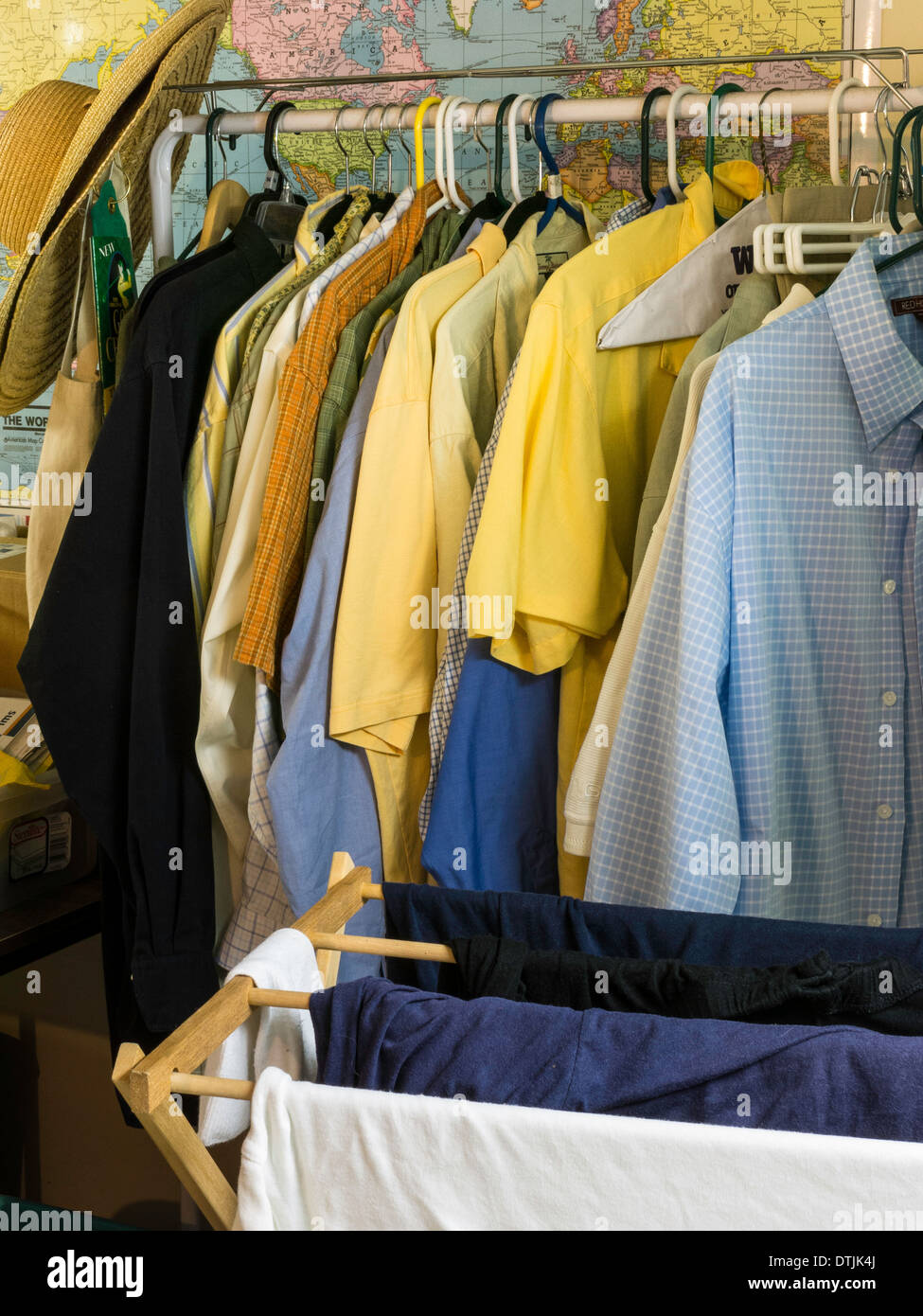Clean Clothes Hanging in a Residential Laundry Room Stock Photo - Alamy