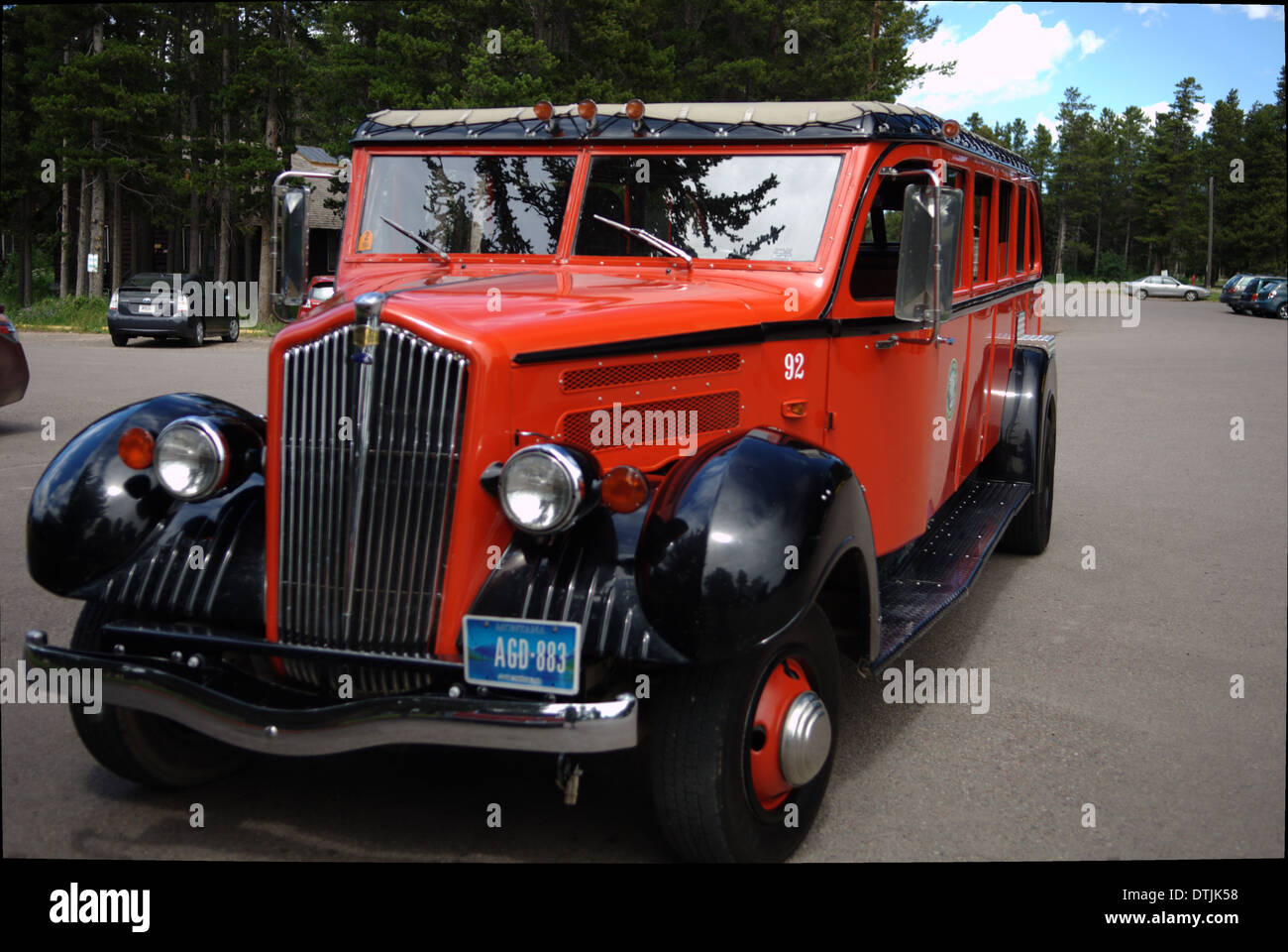 Vintage bus in Glacier National Park, Montana Stock Photo - Alamy