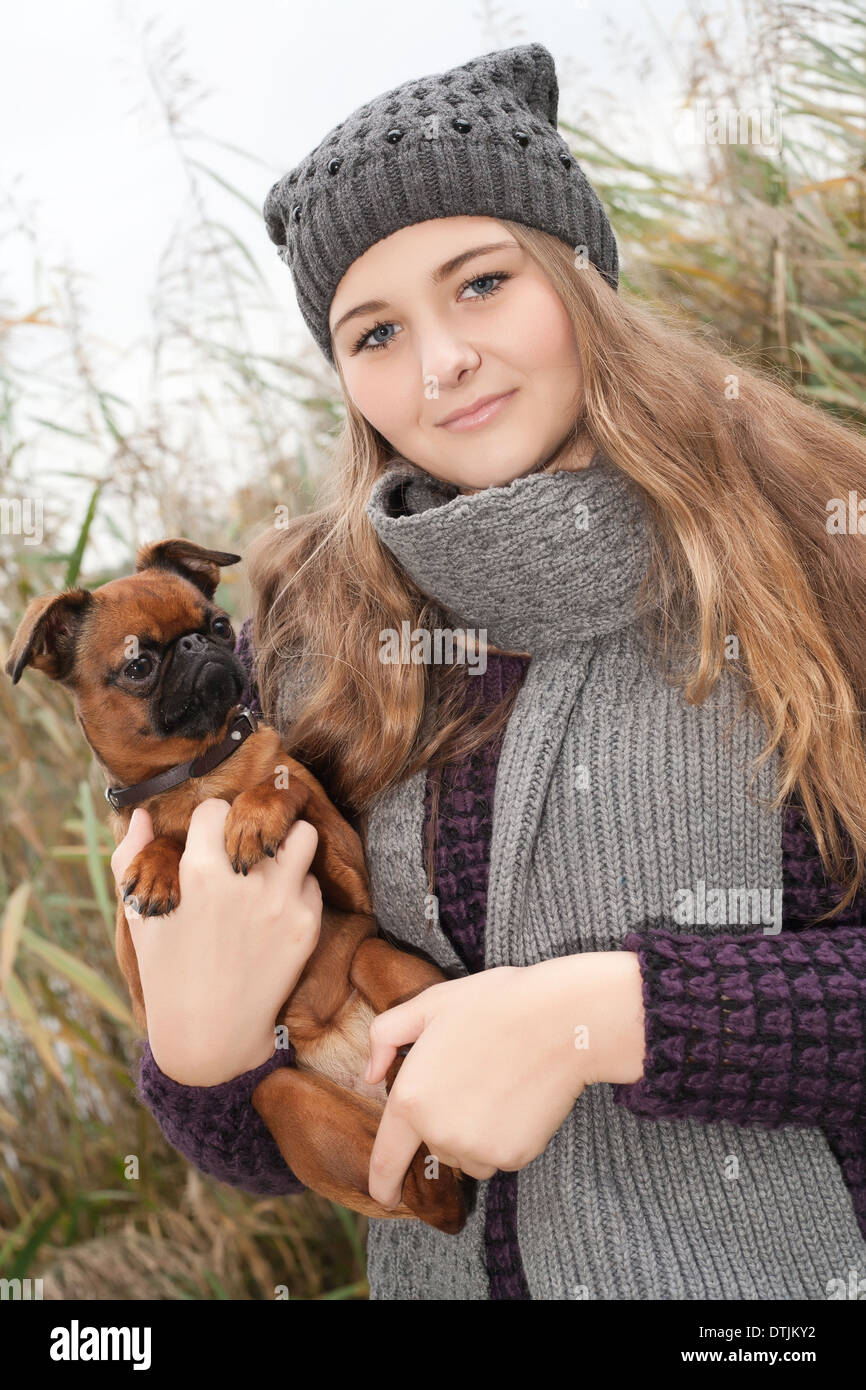 Young teenage girl is having a nice time in the cold november Stock ...