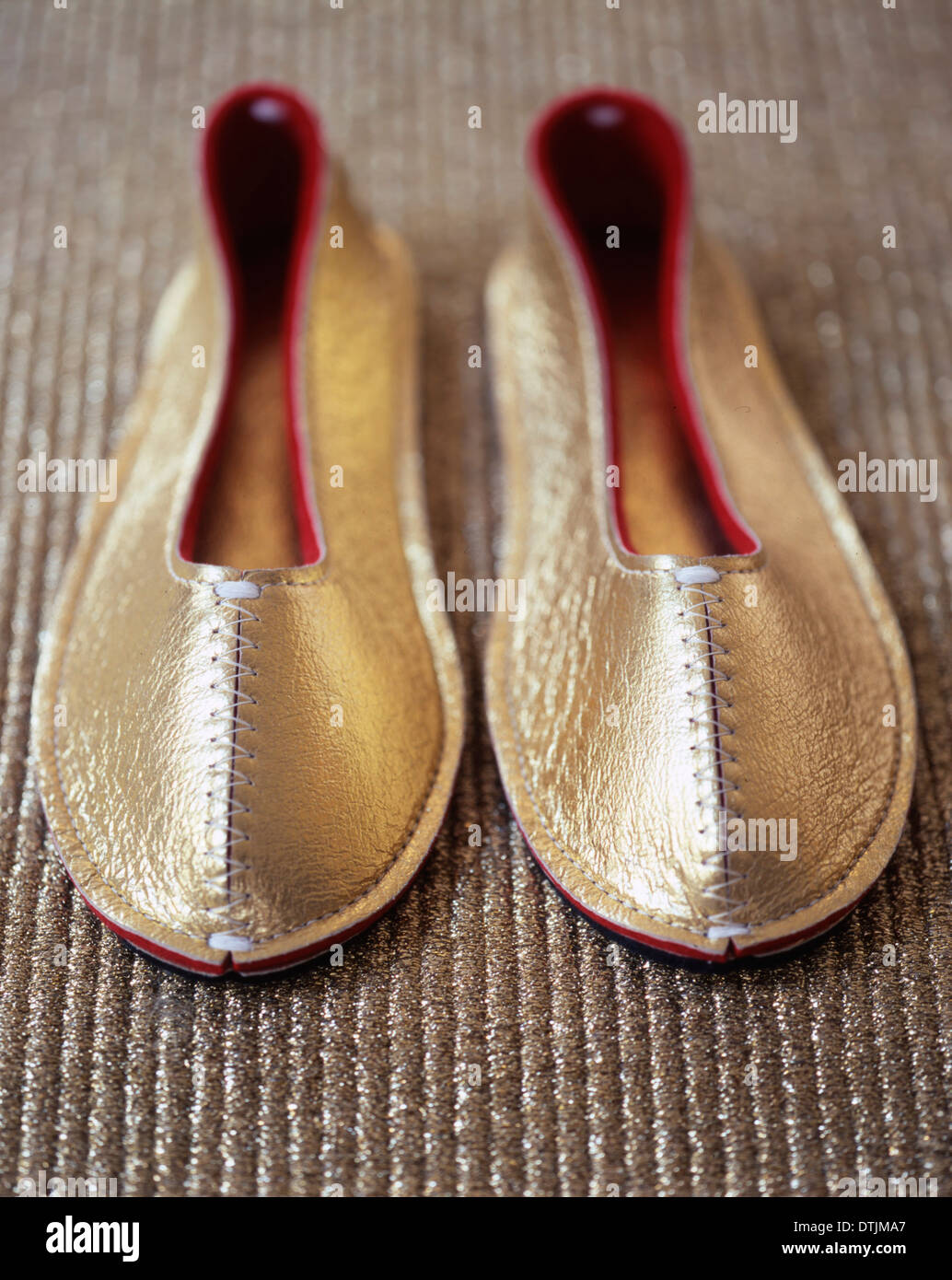 Gold slippers hi-res stock photography and images - Alamy