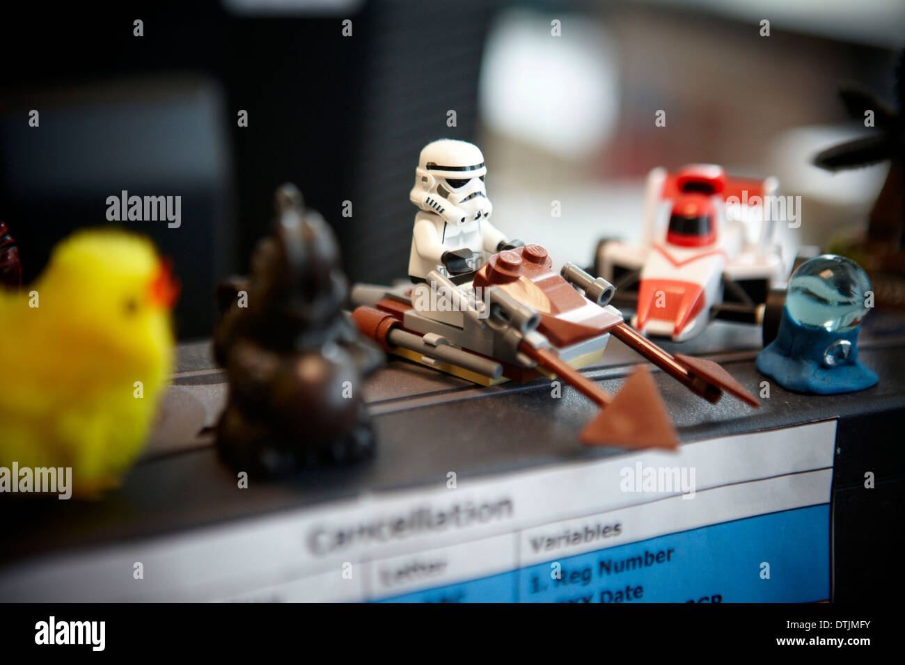 TOYS ON TOP OF A COMPUTER SCREEN Stock Photo - Alamy