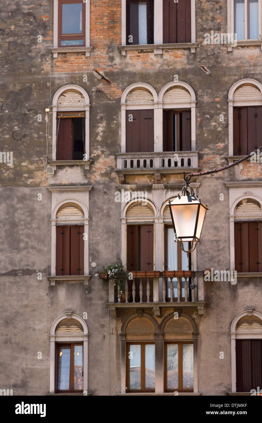 Shuttered windows and street lantern, Architectural details, Venice ...