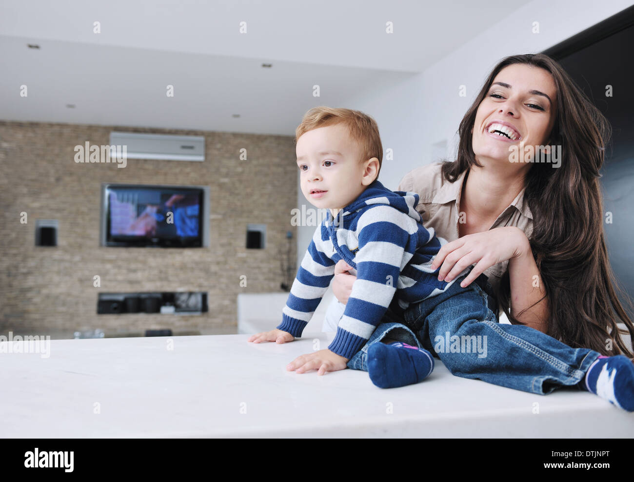 happy mom and son together at home Stock Photo - Alamy