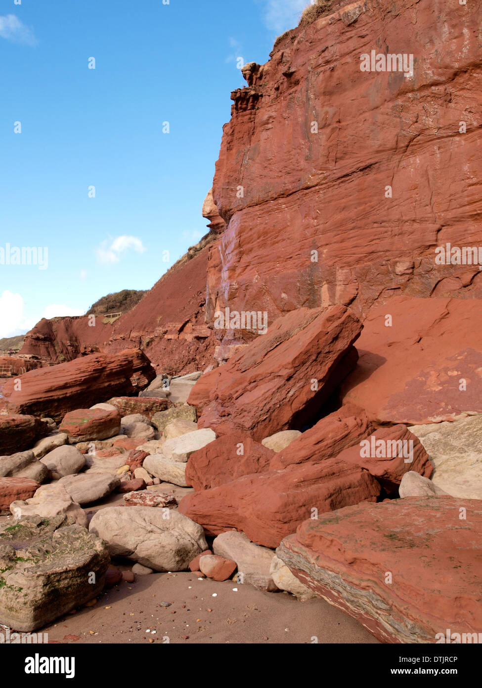 Triassic red rocks on the Jurassic Coast below Orcombe Point, Exmouth ...