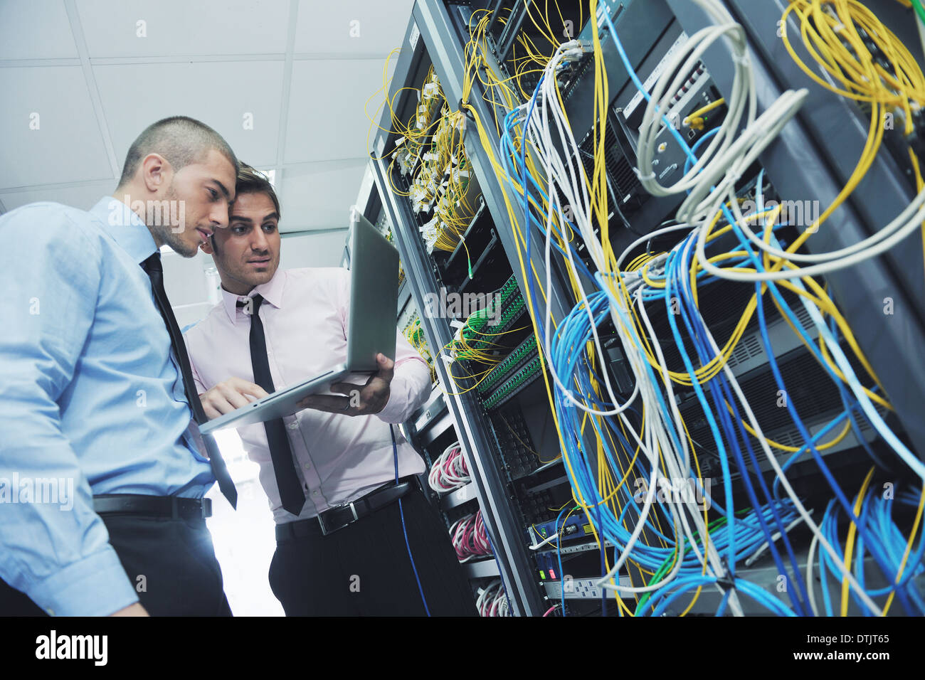 it engineers in network server room Stock Photo - Alamy