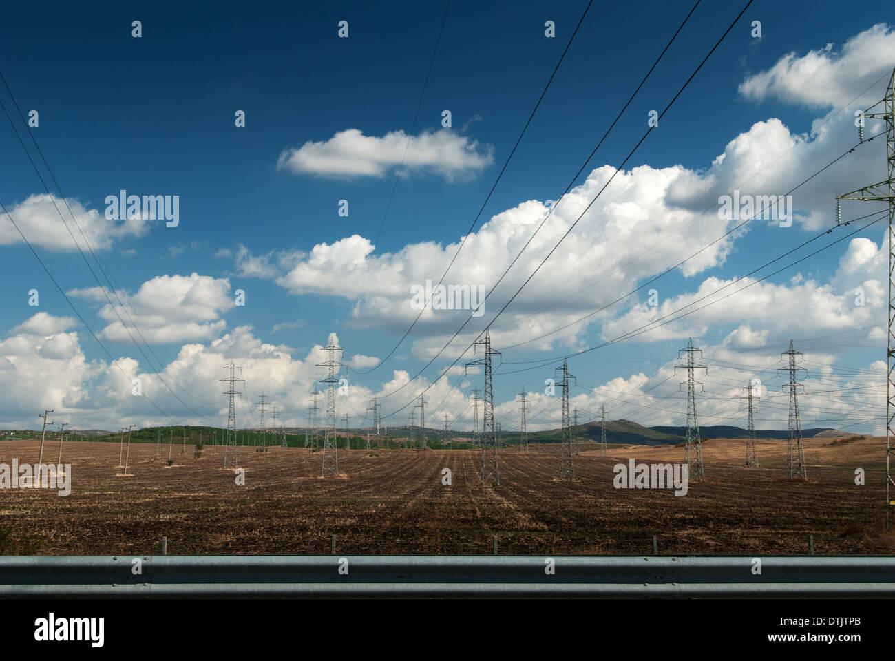 Electric transmission network in the middle of broken ground Stock ...